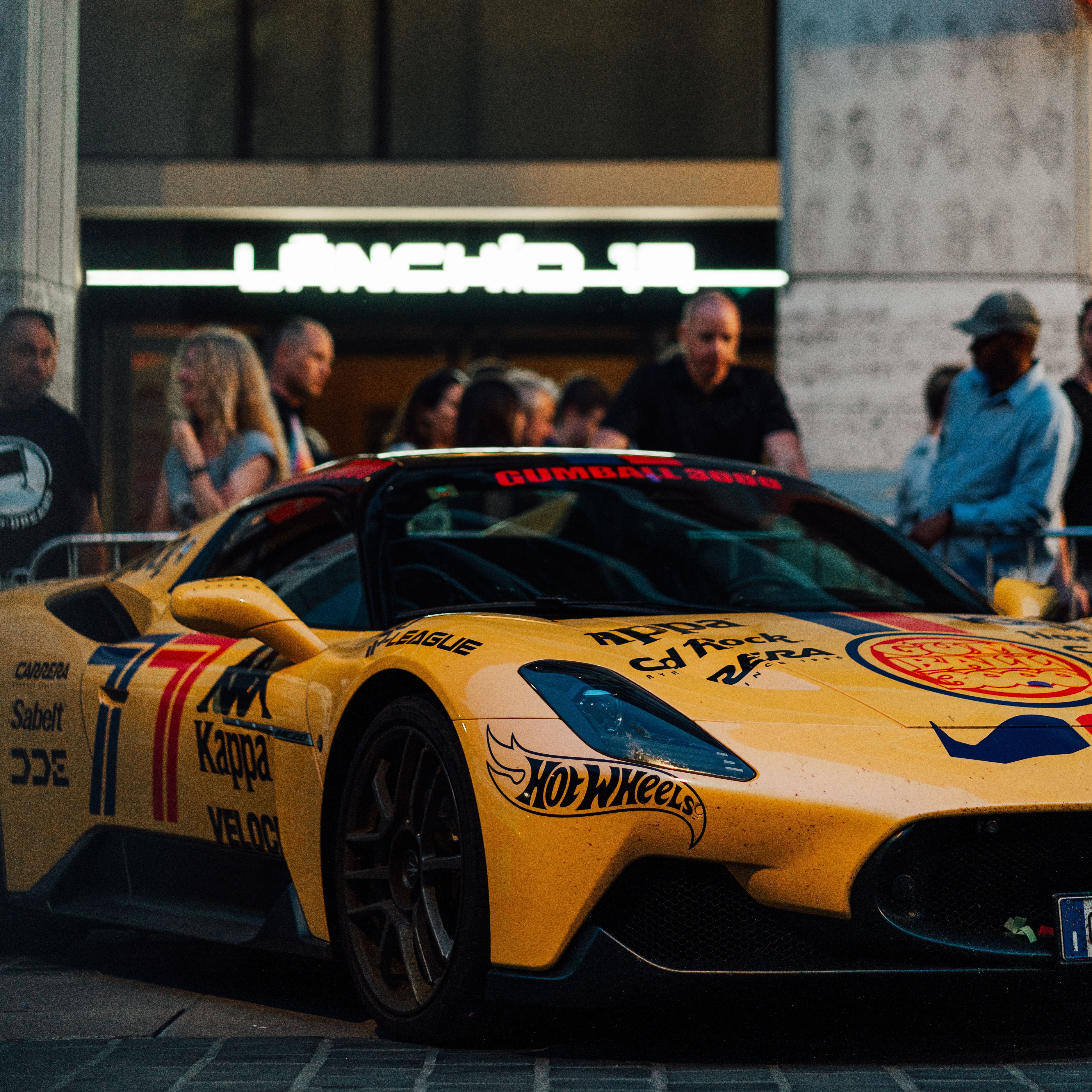 Yellow Maserati MC20 Sports Car Parked on a City Street · Free Stock Photo