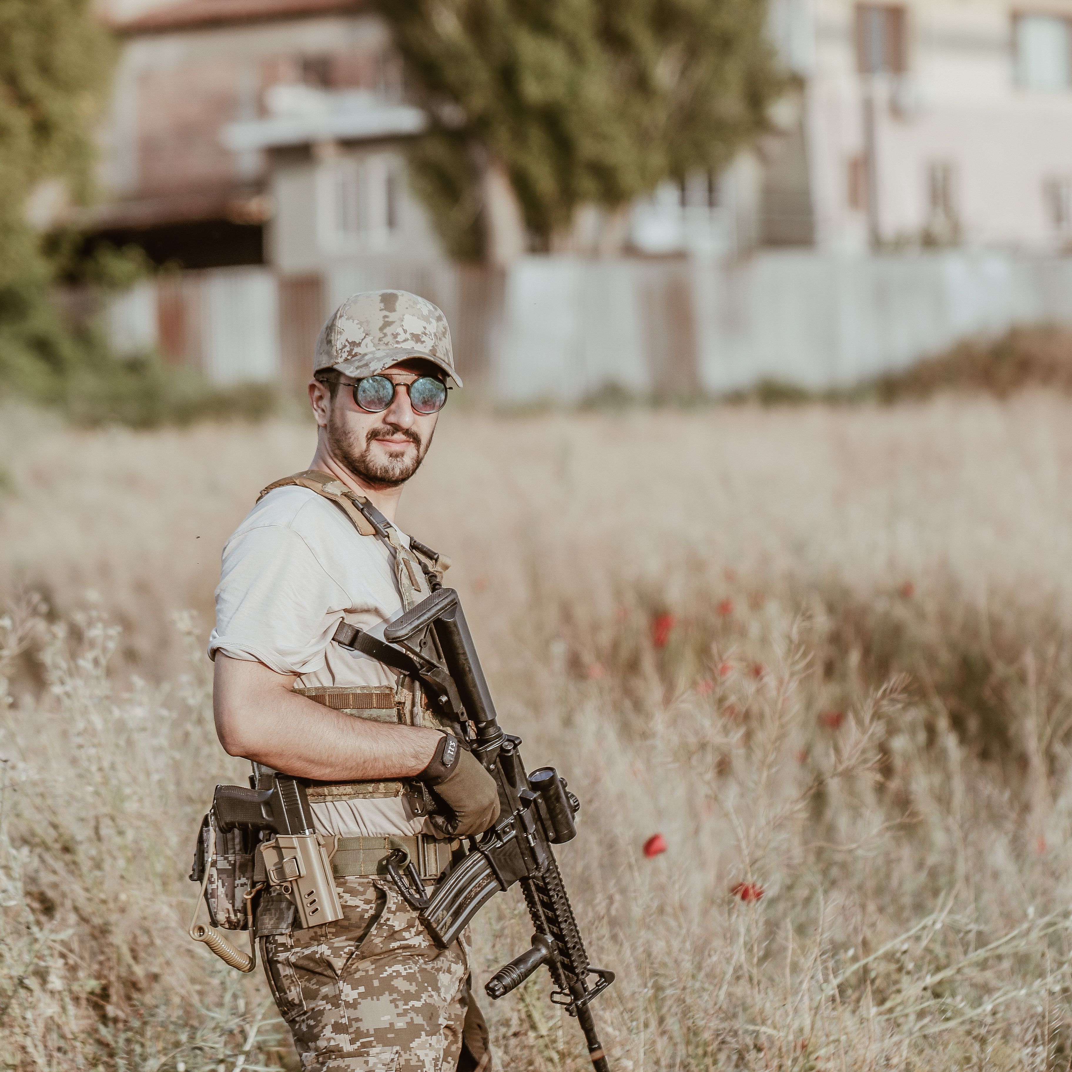Redhead Man with Machine Gun · Free Stock Photo
