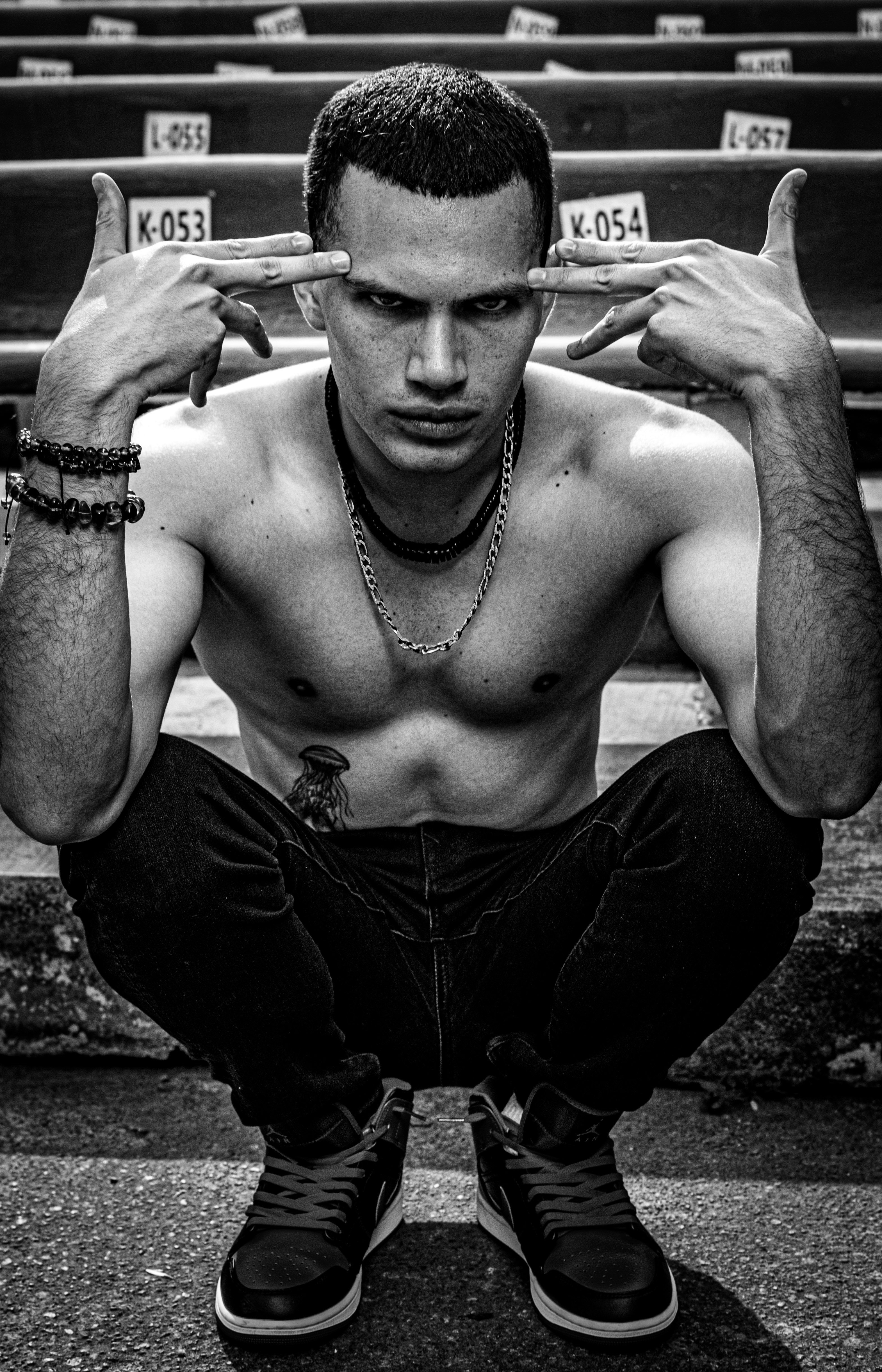 Black and White Photography of a Young Shirtless Man Crouching · Free ...