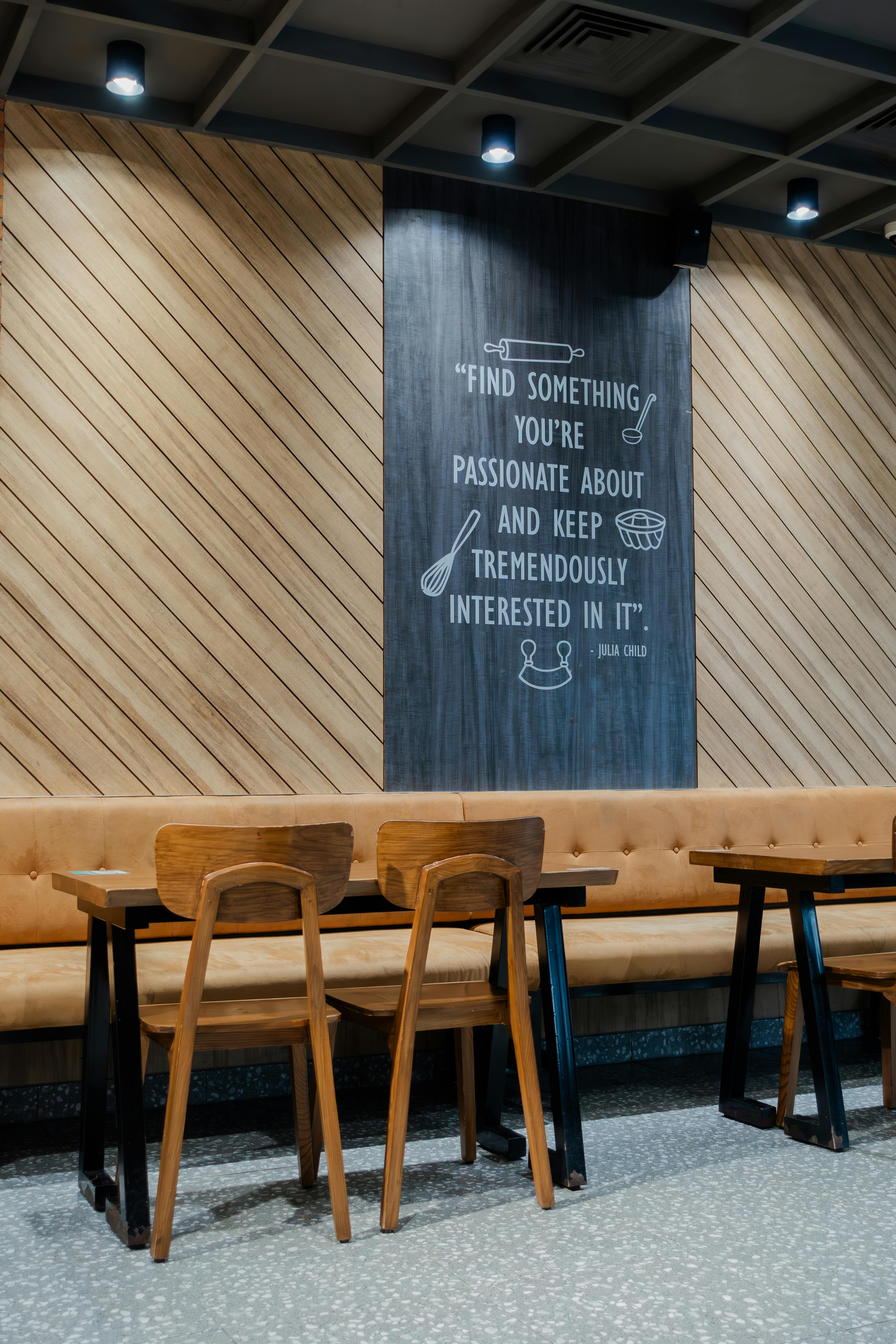 Sign on the Wall of a Restaurant · Free Stock Photo