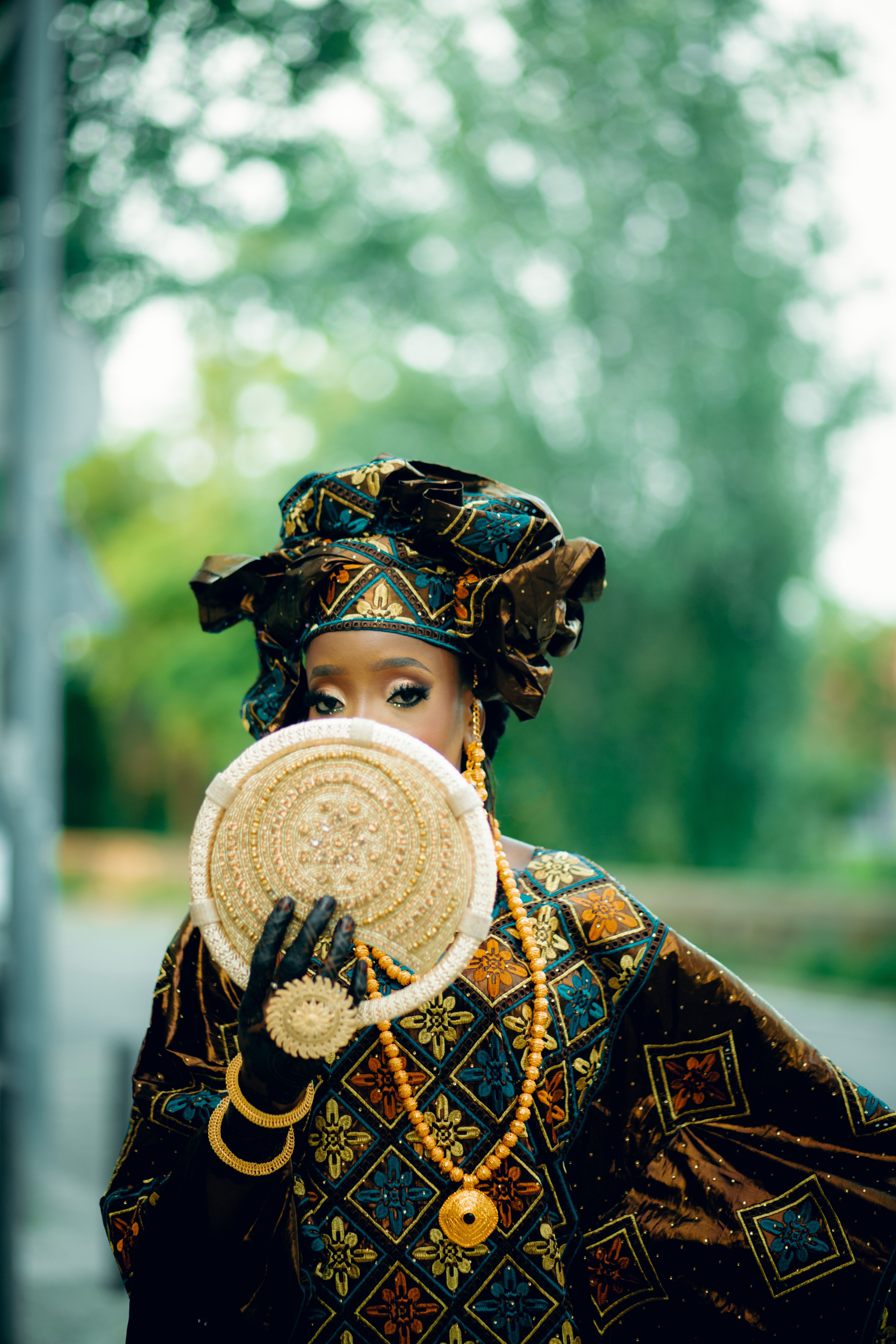 Woman in Traditional, Decorated Dress · Free Stock Photo