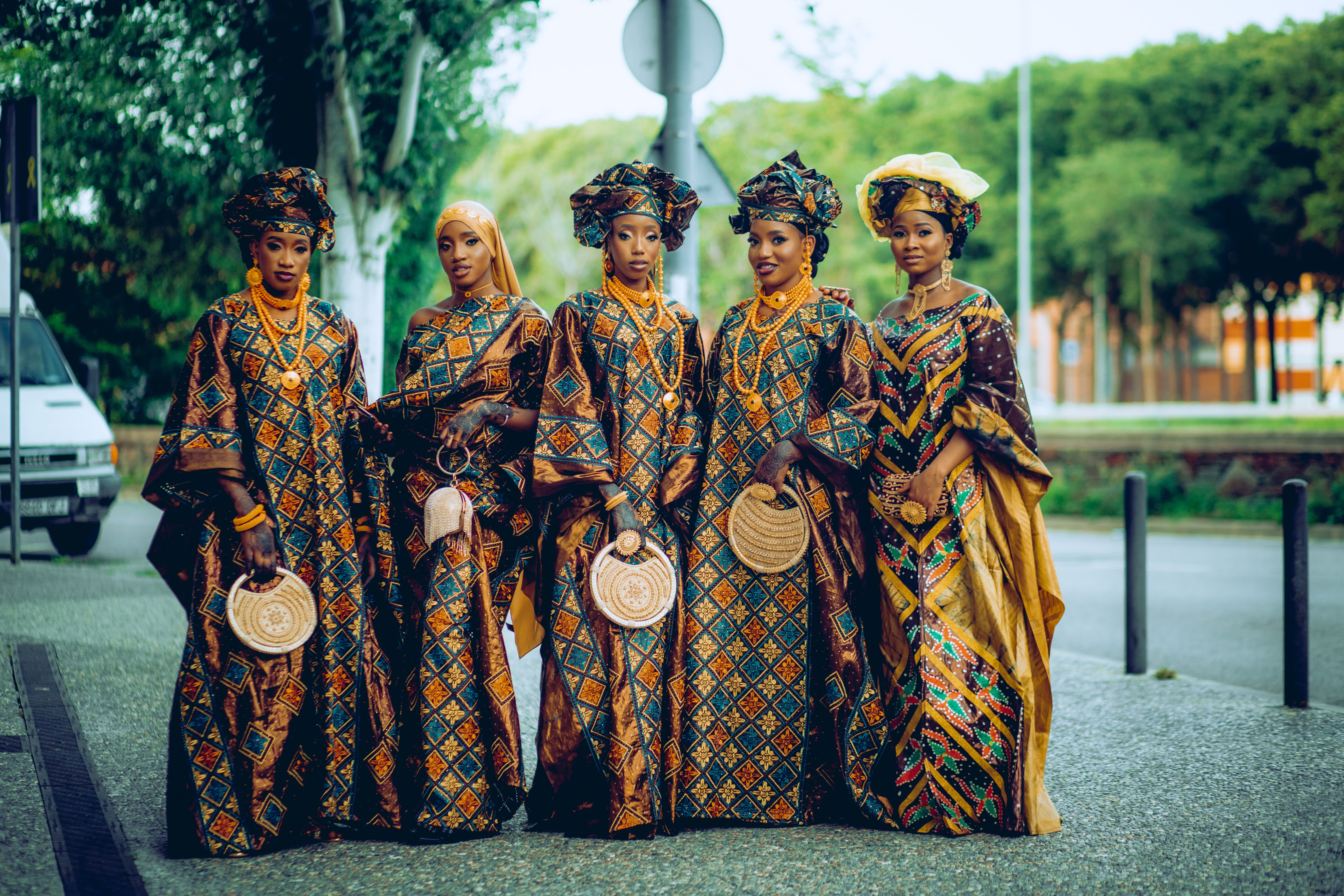 Women Posing in Traditional Clothing · Free Stock Photo
