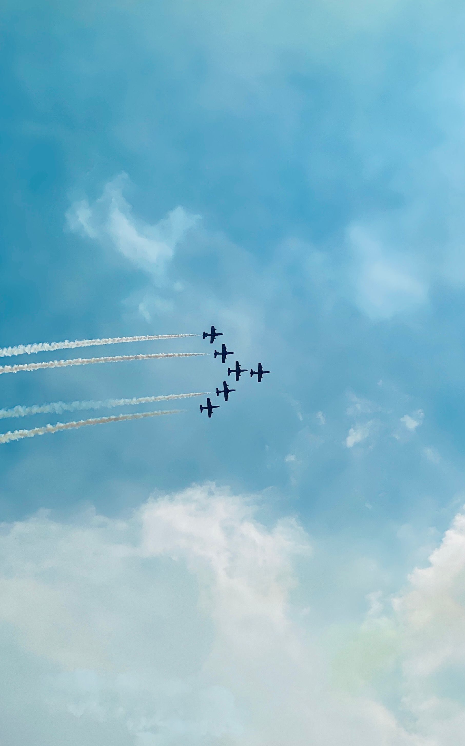 Planes Flying in a Formation at Airshow Leaving White Smoke Trails ...