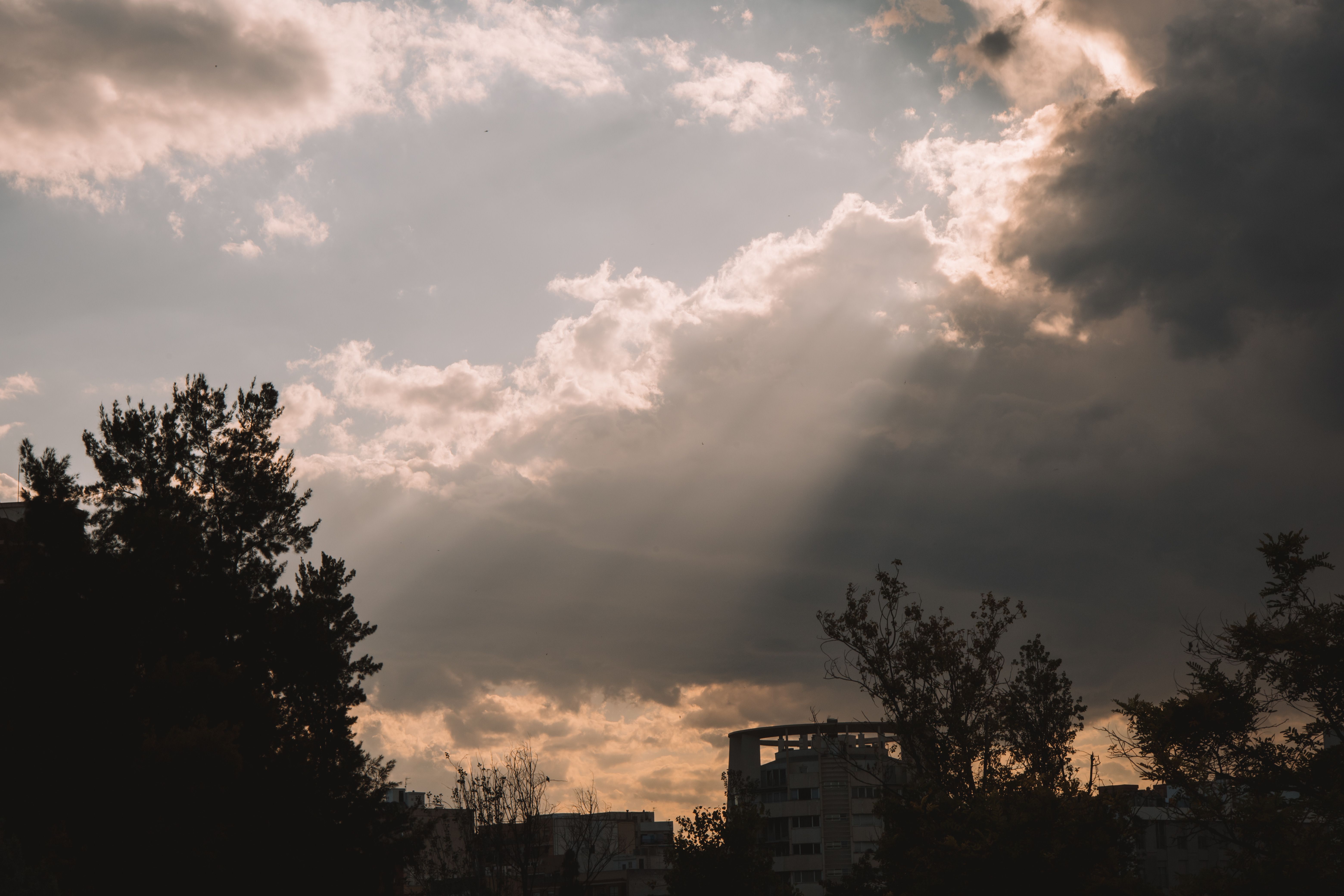 Residential Buildings Under Cloudy Sky · Free Stock Photo