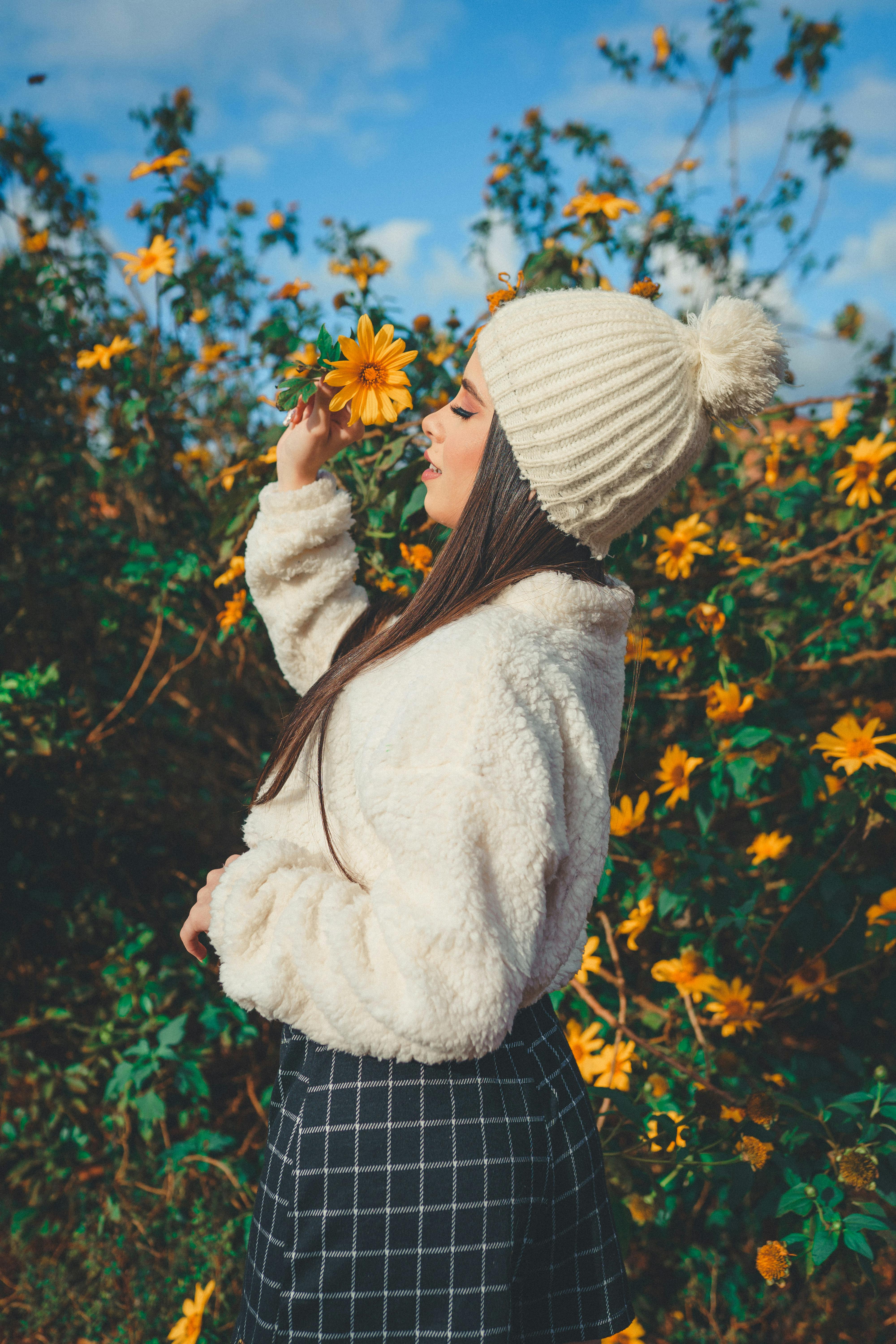 Woman Sniffing Flower · Free Stock Photo