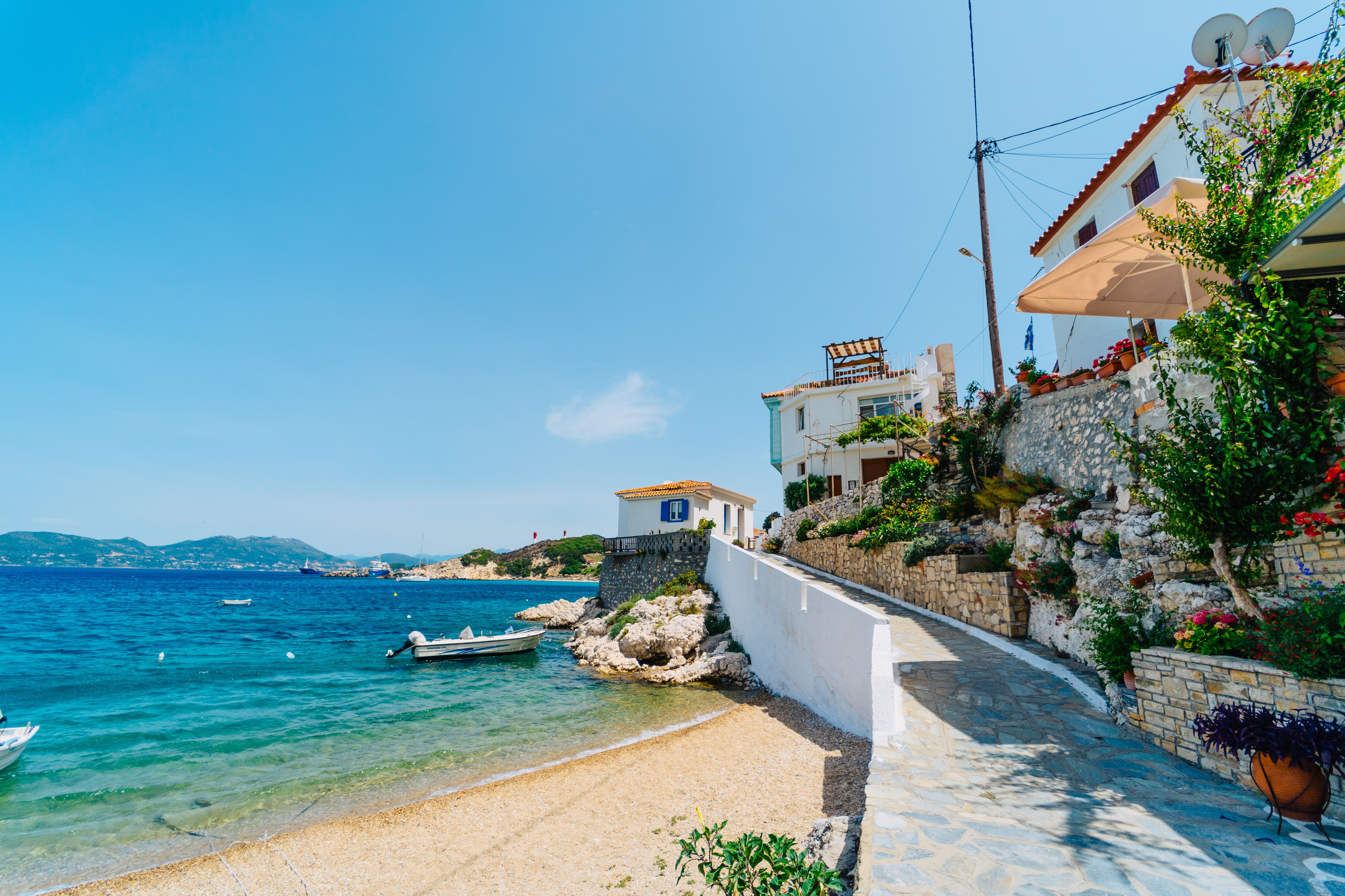 Sidewalk Along Beach in Resort · Free Stock Photo