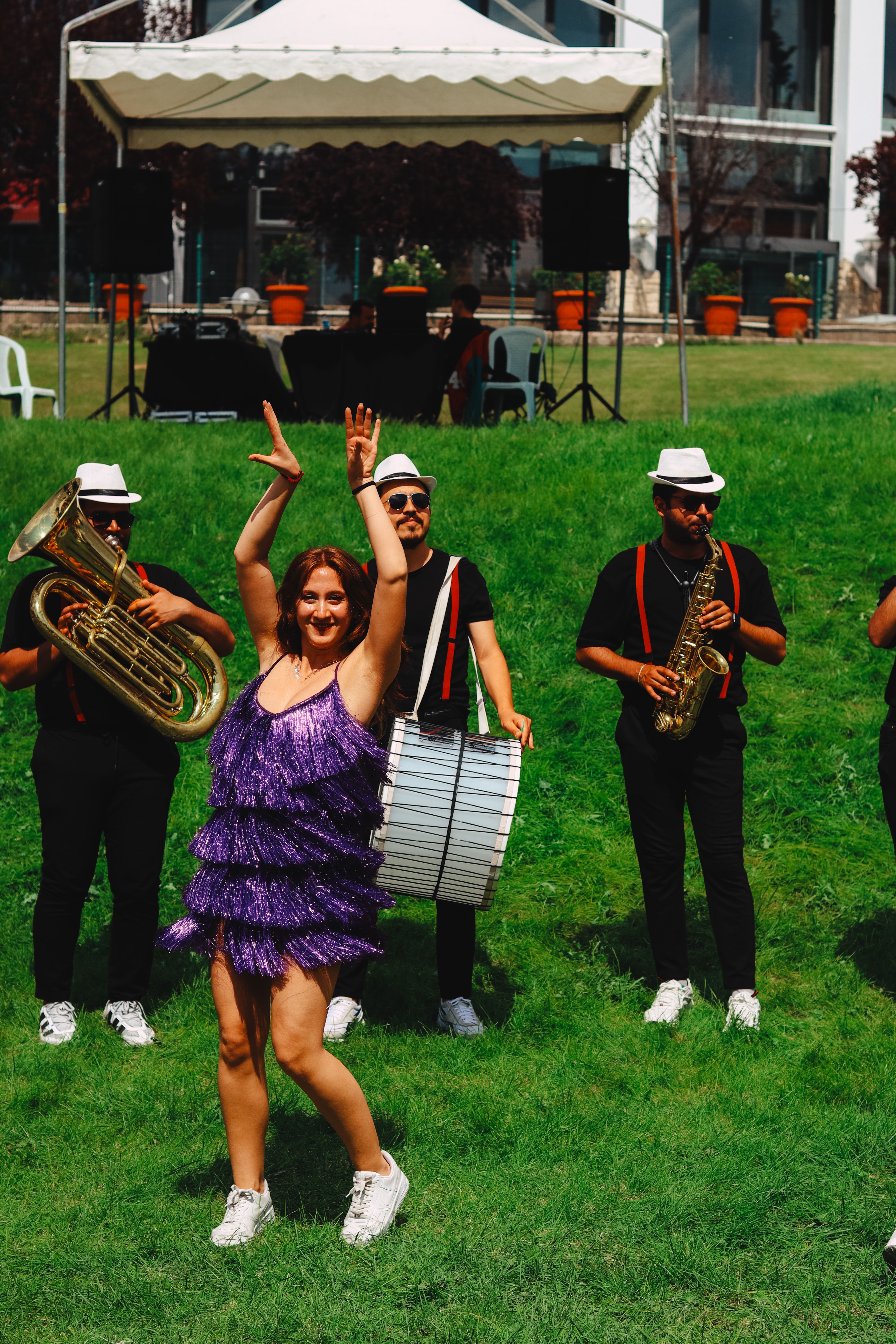 Musicians Playing and Woman in Purple Dress Dancing · Free Stock Photo