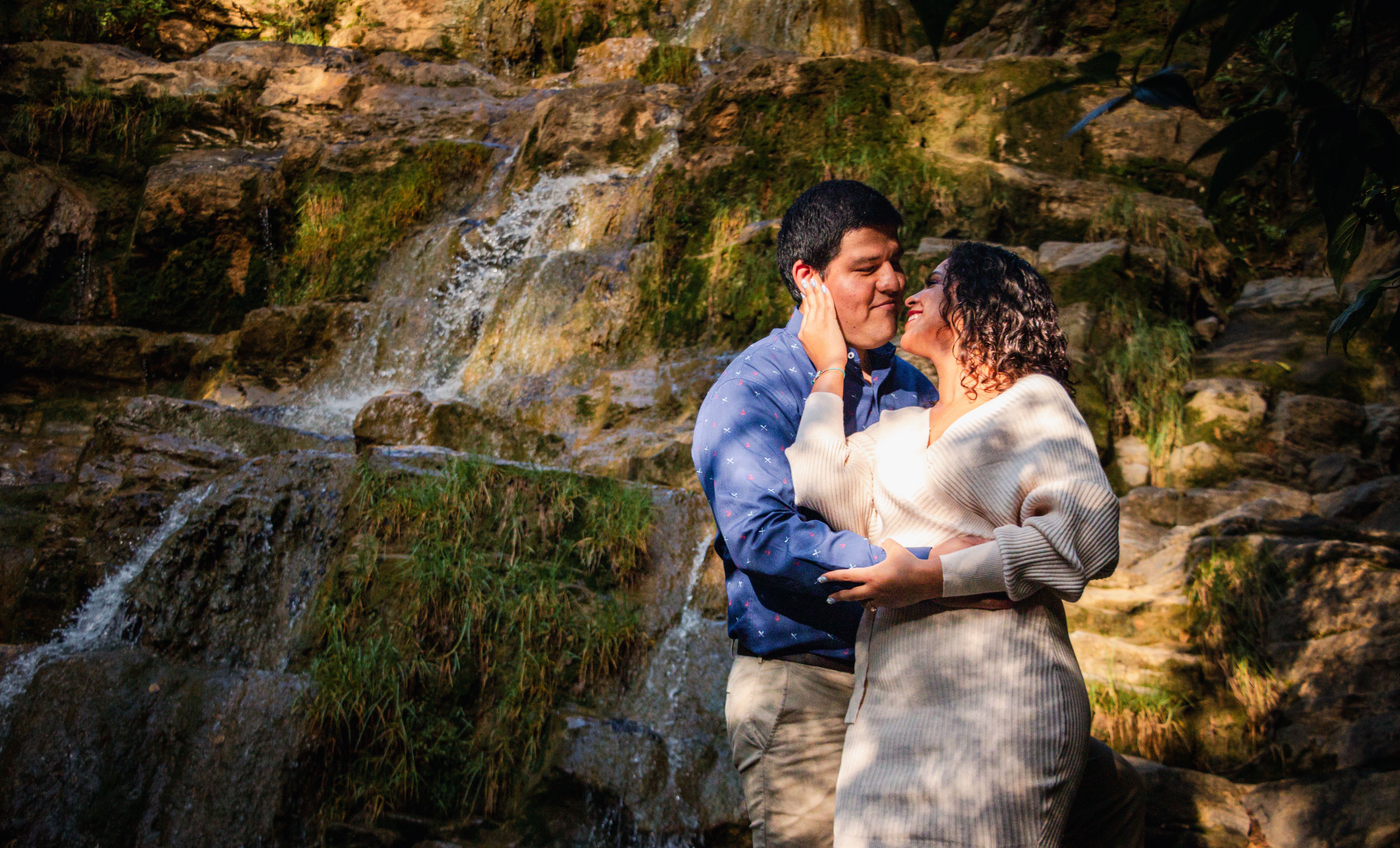 Romantic Couple by Waterfall · Free Stock Photo