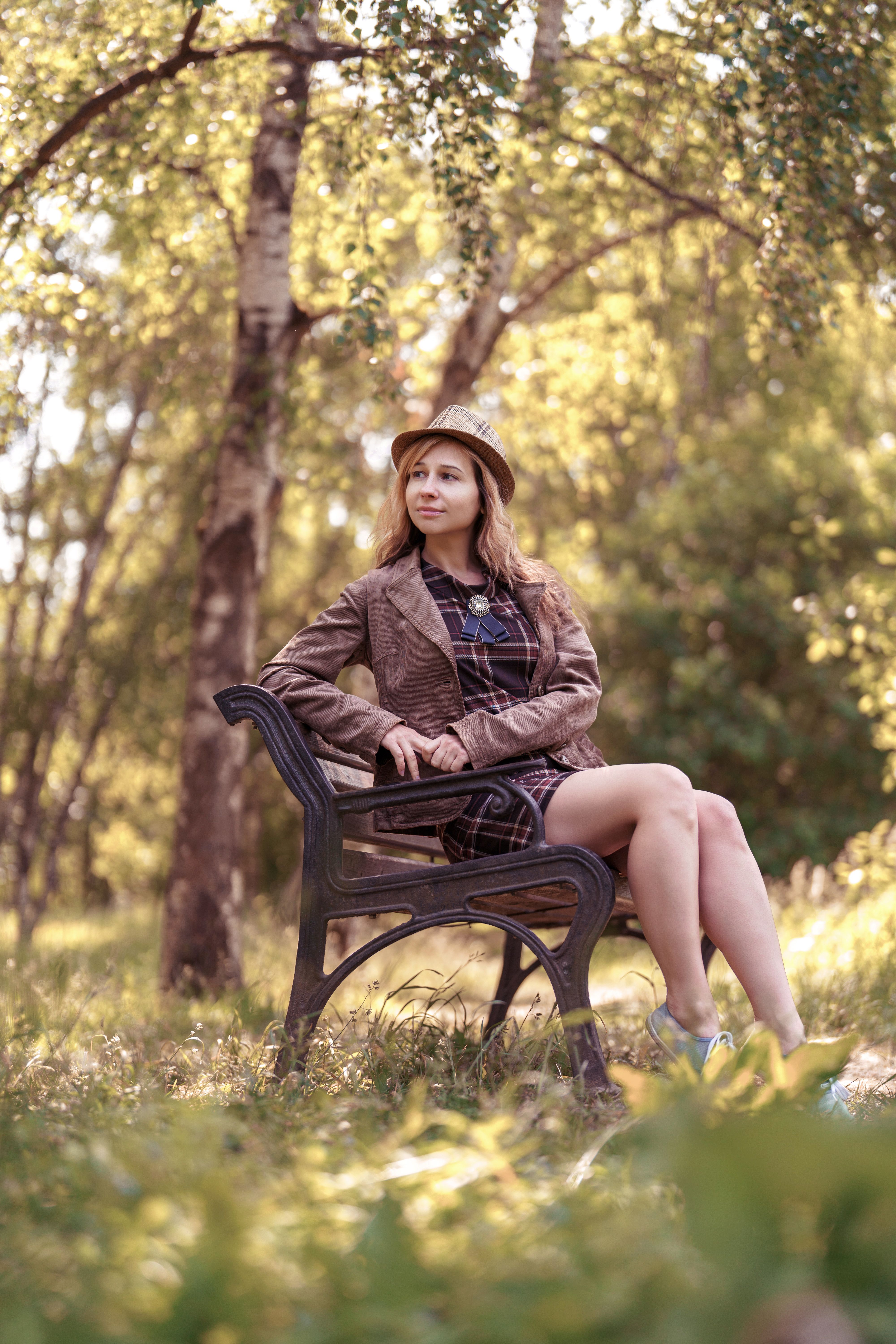 Woman Sitting and Posing in Forest · Free Stock Photo
