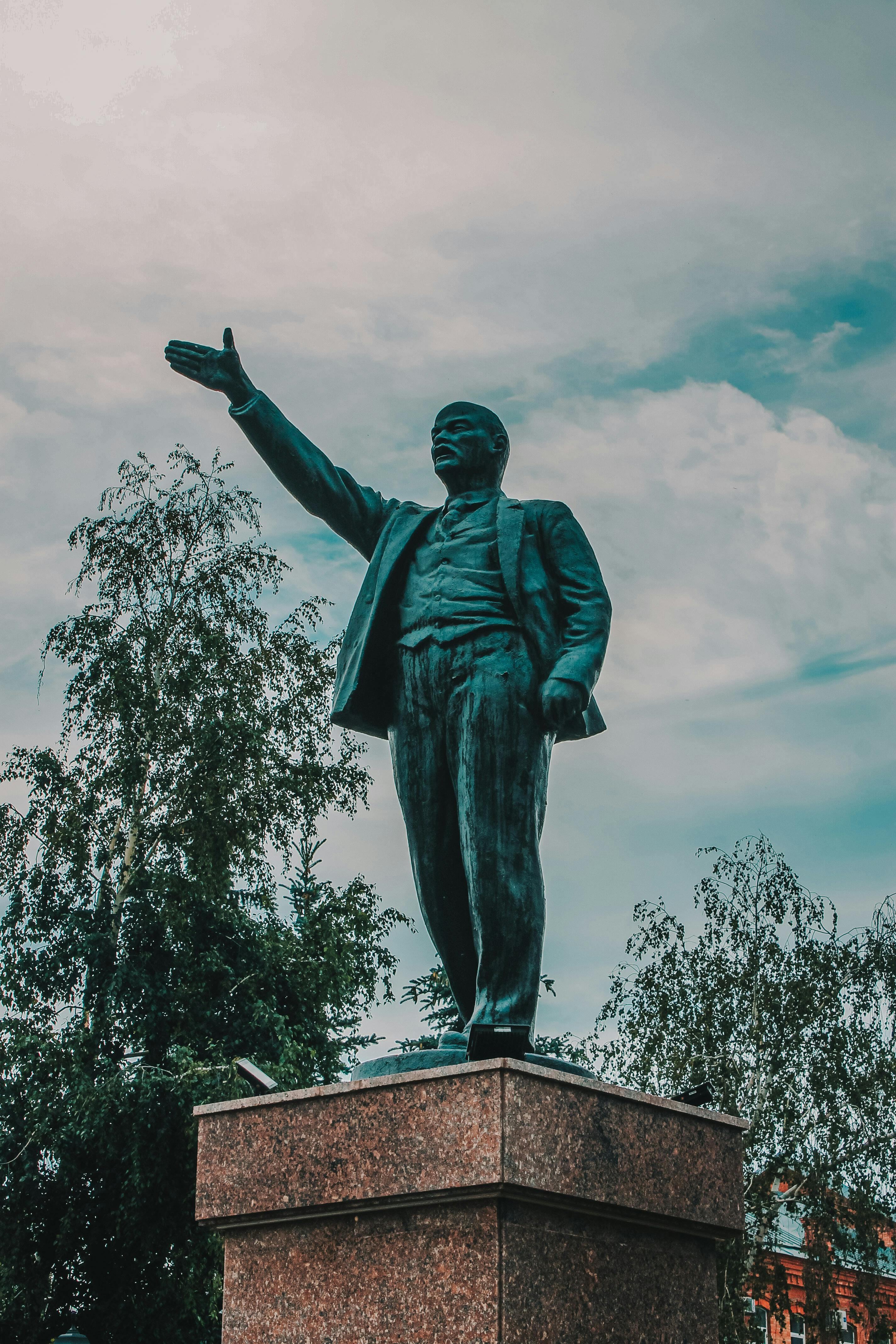 Stalin Statue among Trees · Free Stock Photo