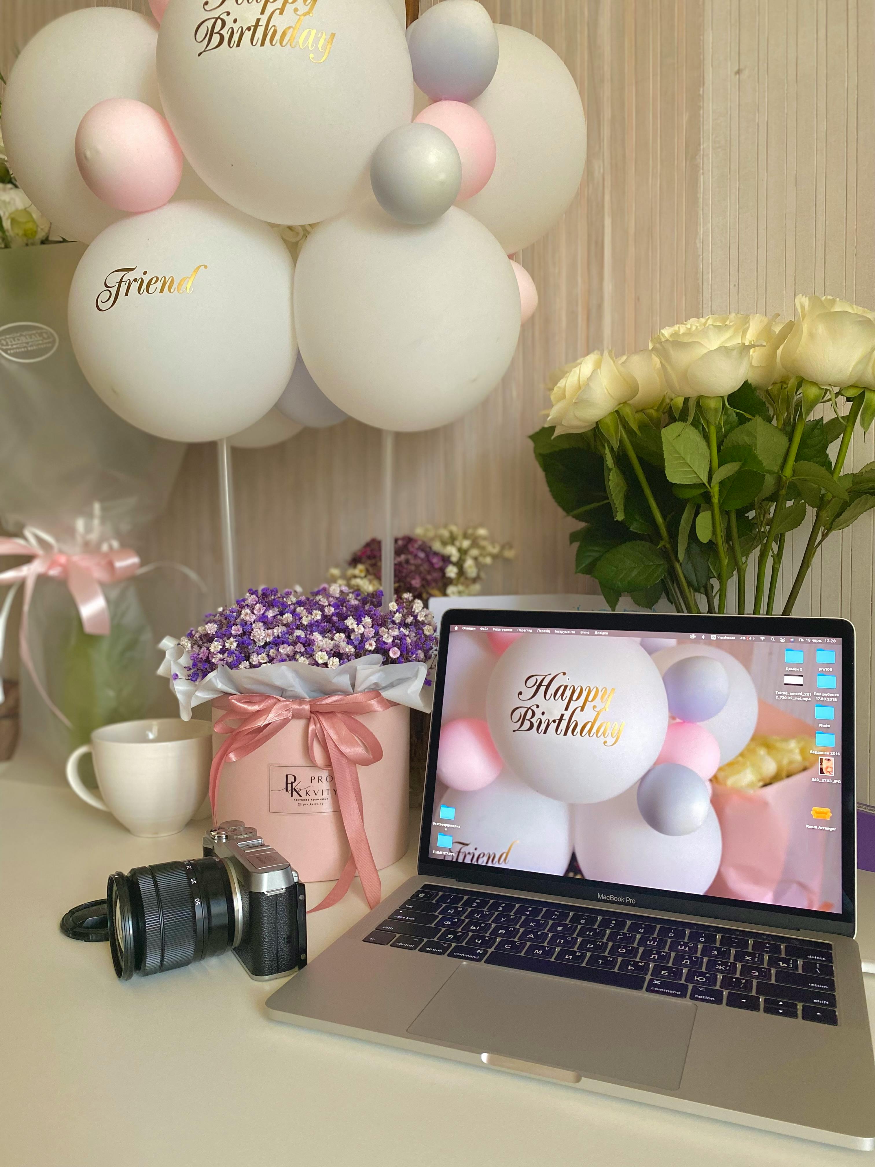 Birthday Balloons and Decorations around Laptop · Free Stock Photo