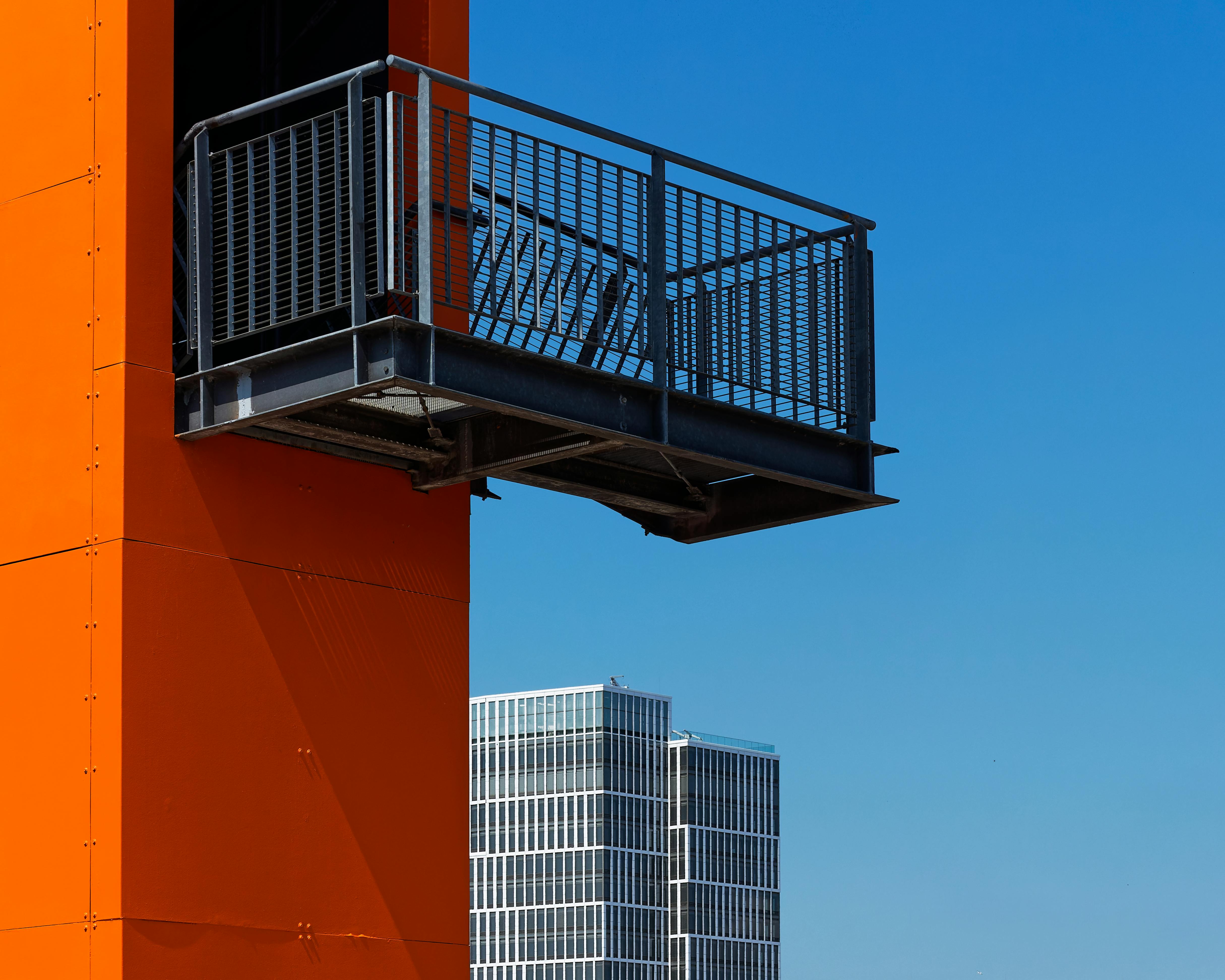 Ornamented Building Corner with Balconies · Free Stock Photo