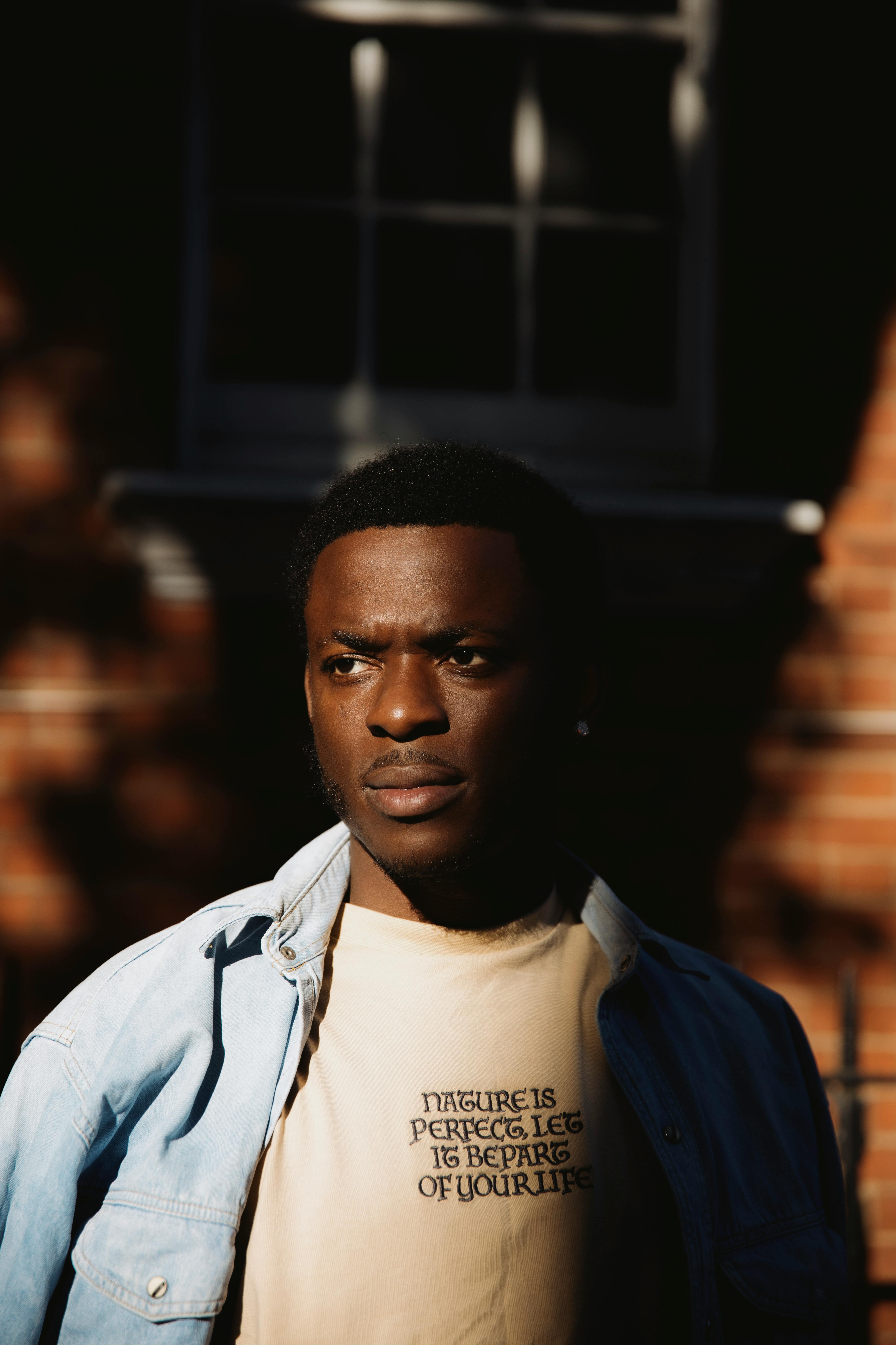 Sunlit Face of Man in Shirt · Free Stock Photo