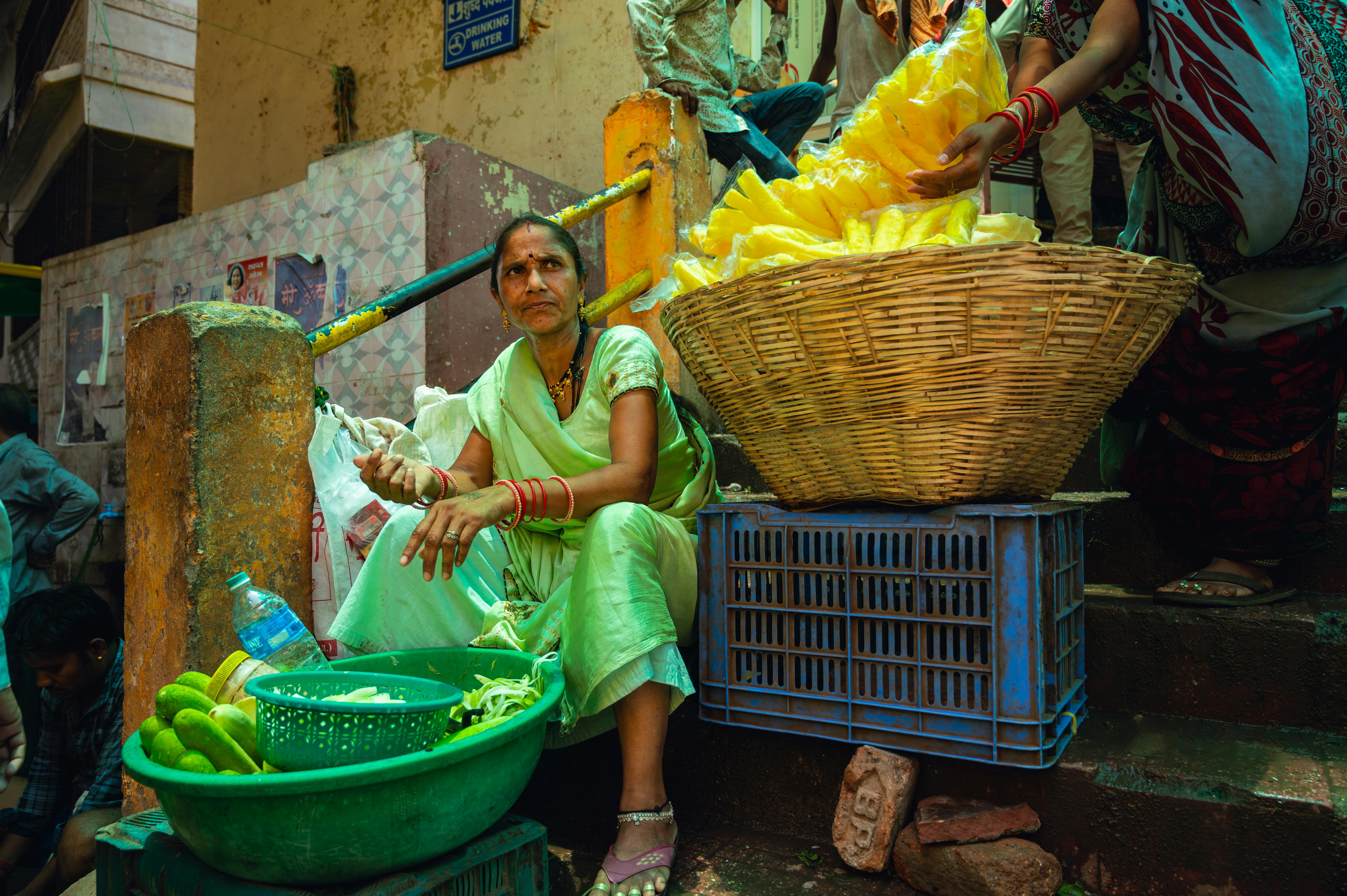Woman Bending over Pots · Free Stock Photo