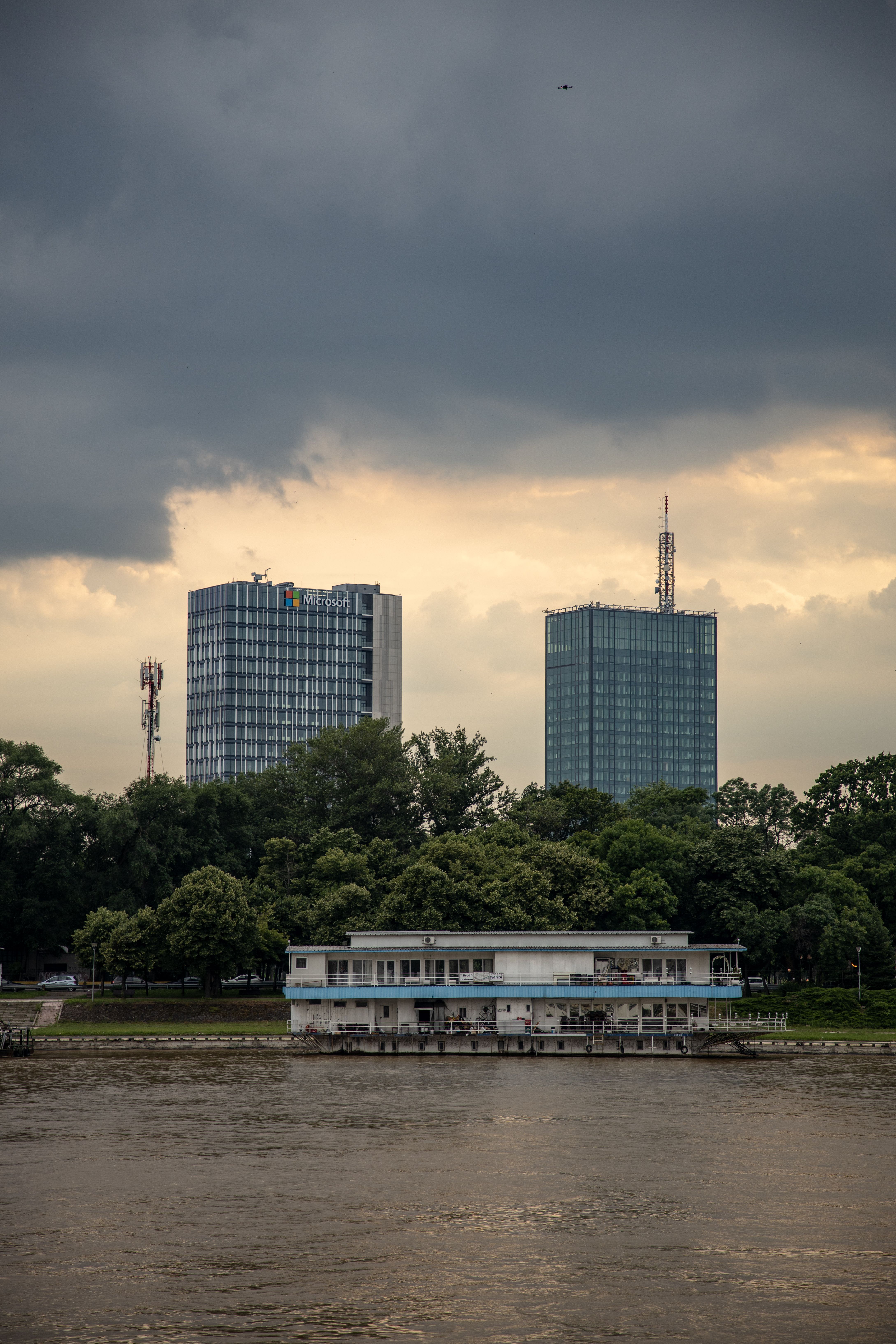 Rain Cloud over City with River · Free Stock Photo