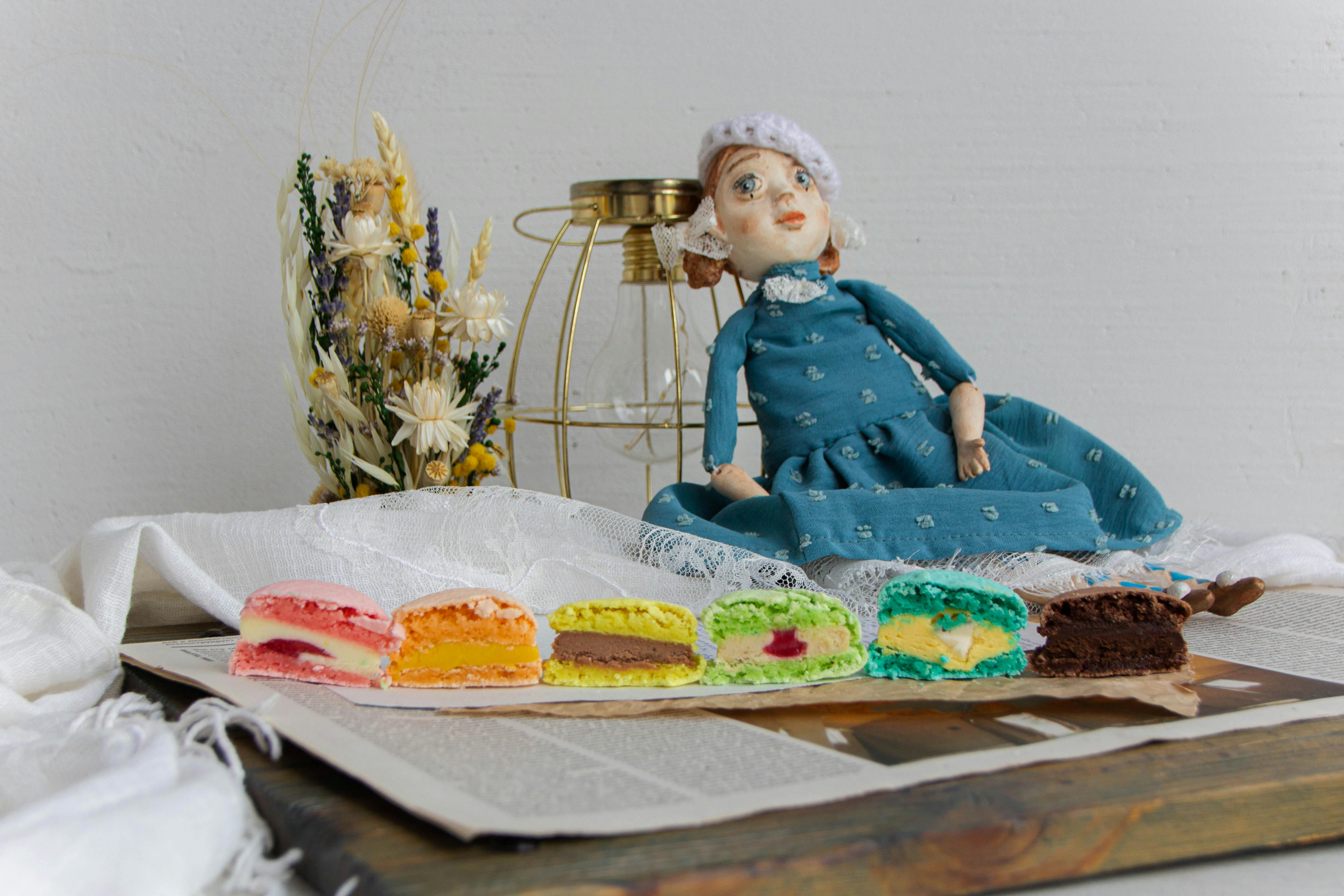 Cut Delicious Macarons on Table · Free Stock Photo