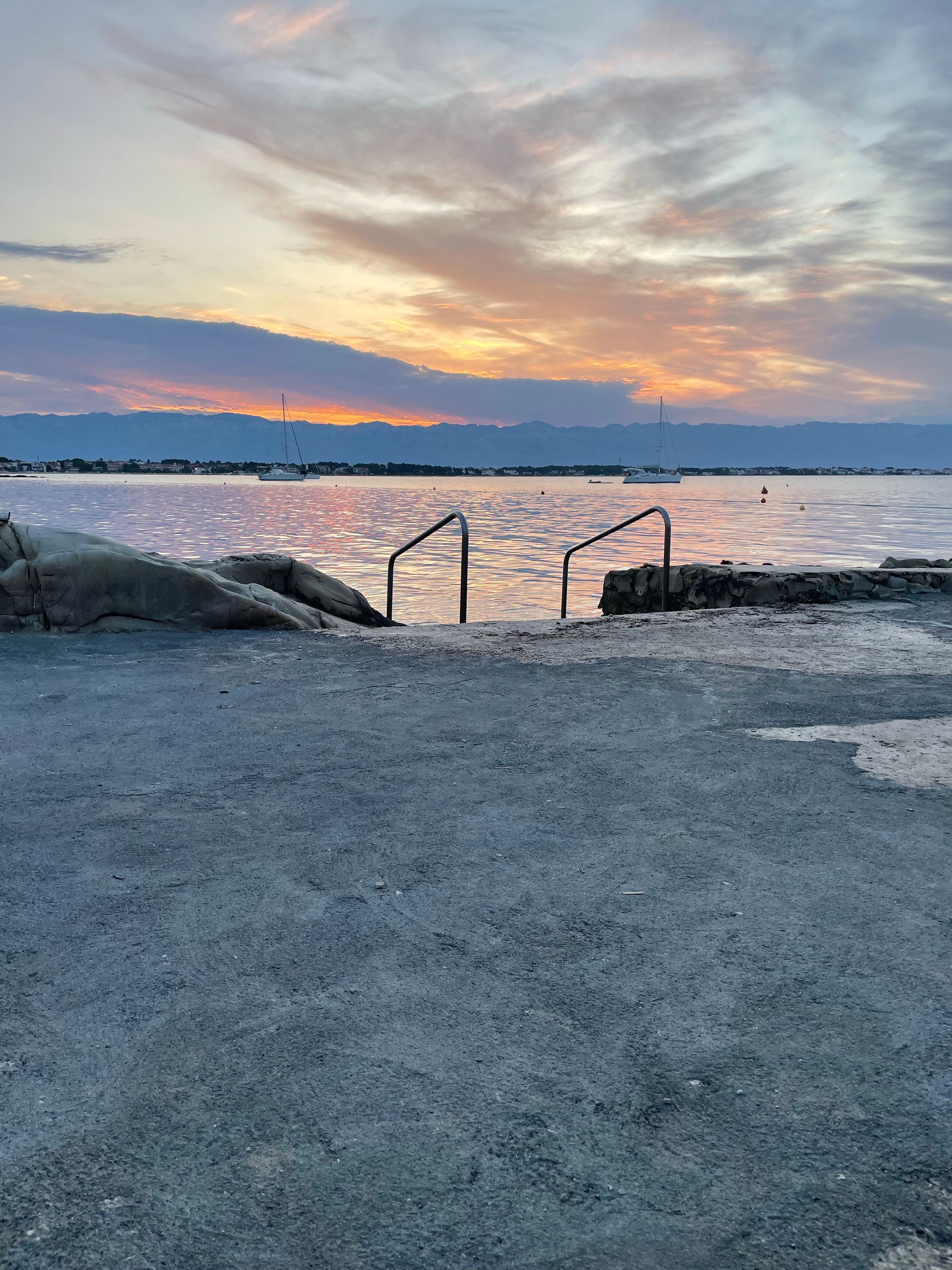 Pavement near River at Sunset · Free Stock Photo