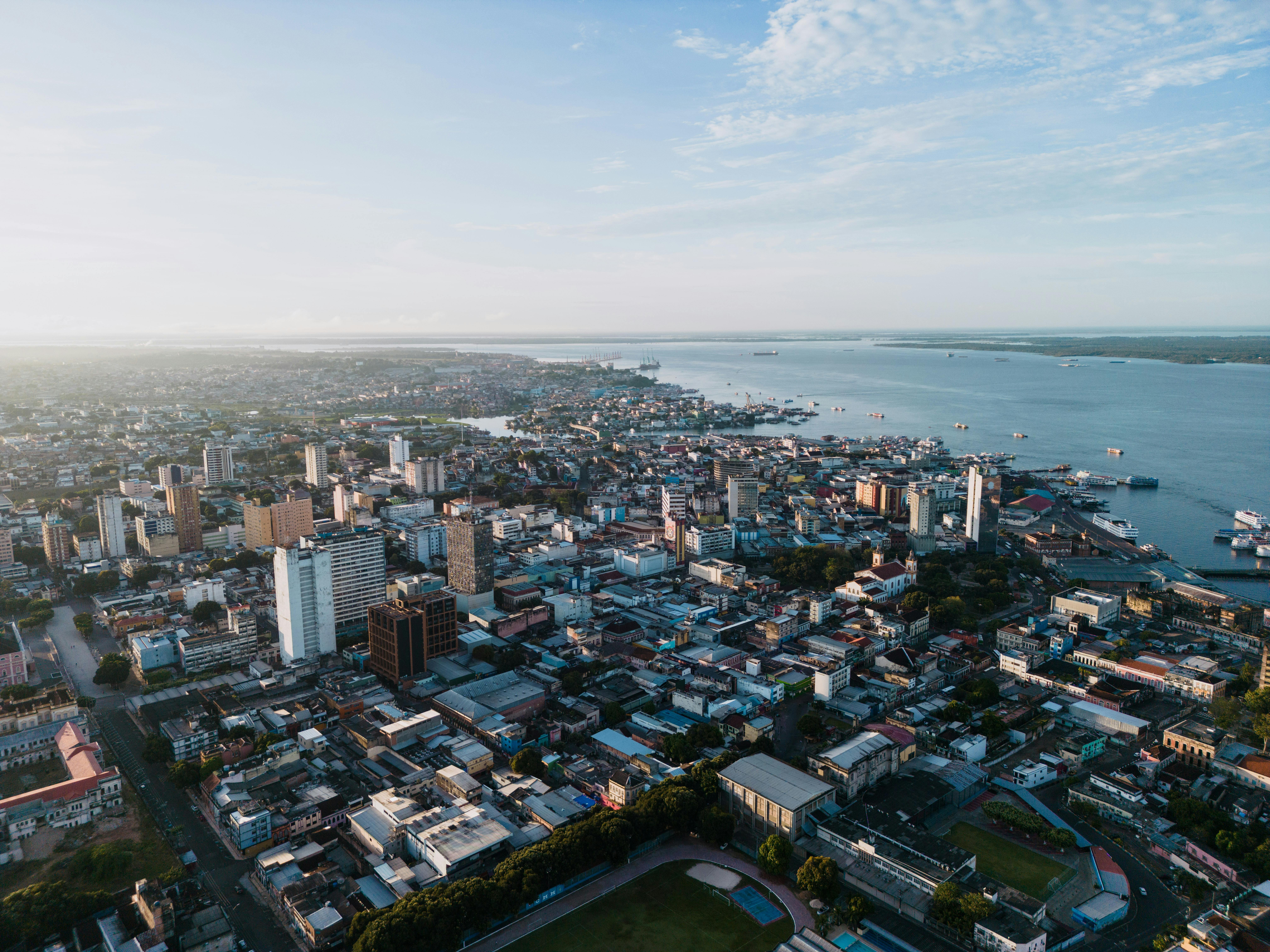 Skyscrapers in Modern City near Water · Free Stock Photo