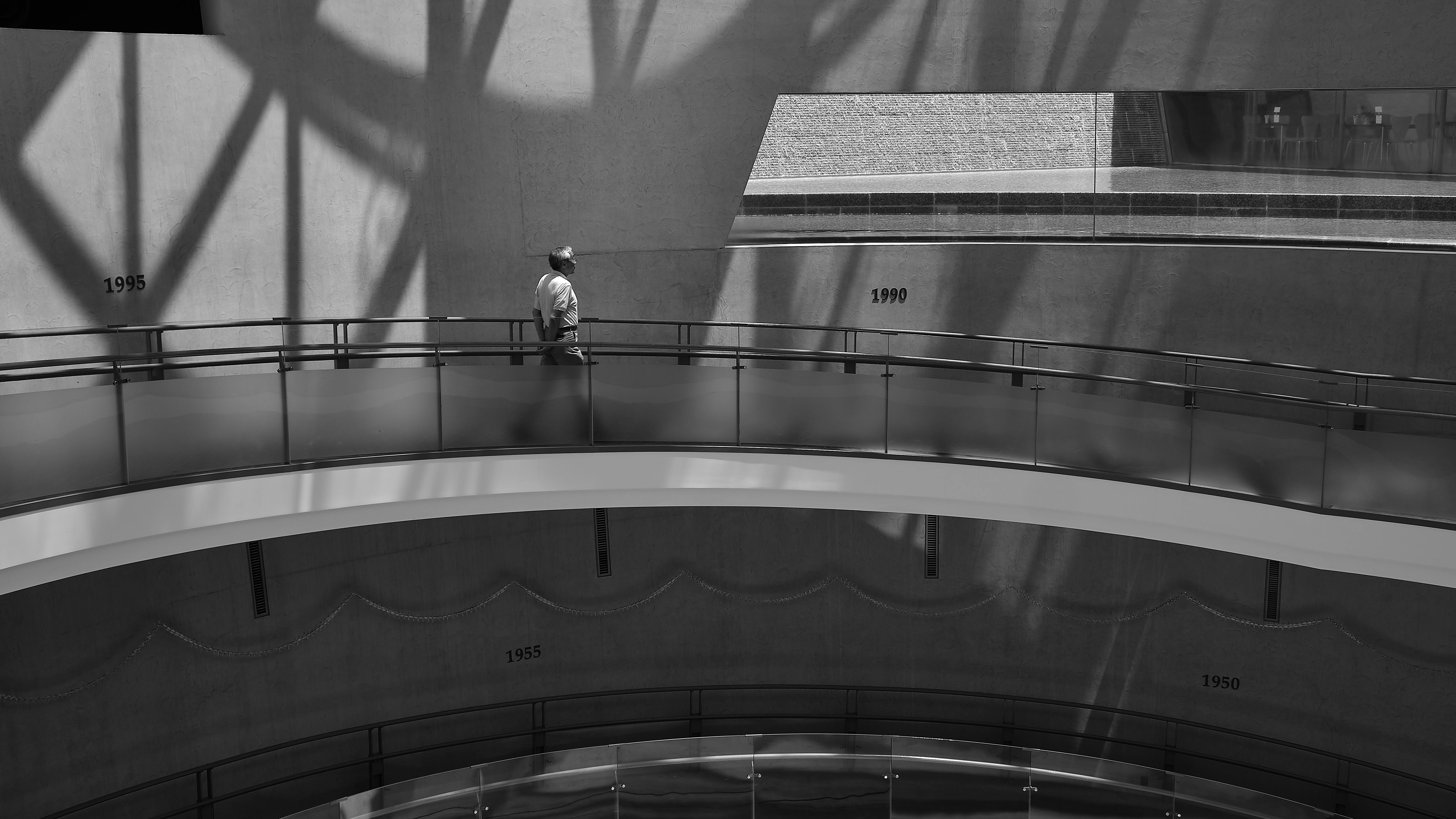 Man Standing Inside a Building · Free Stock Photo