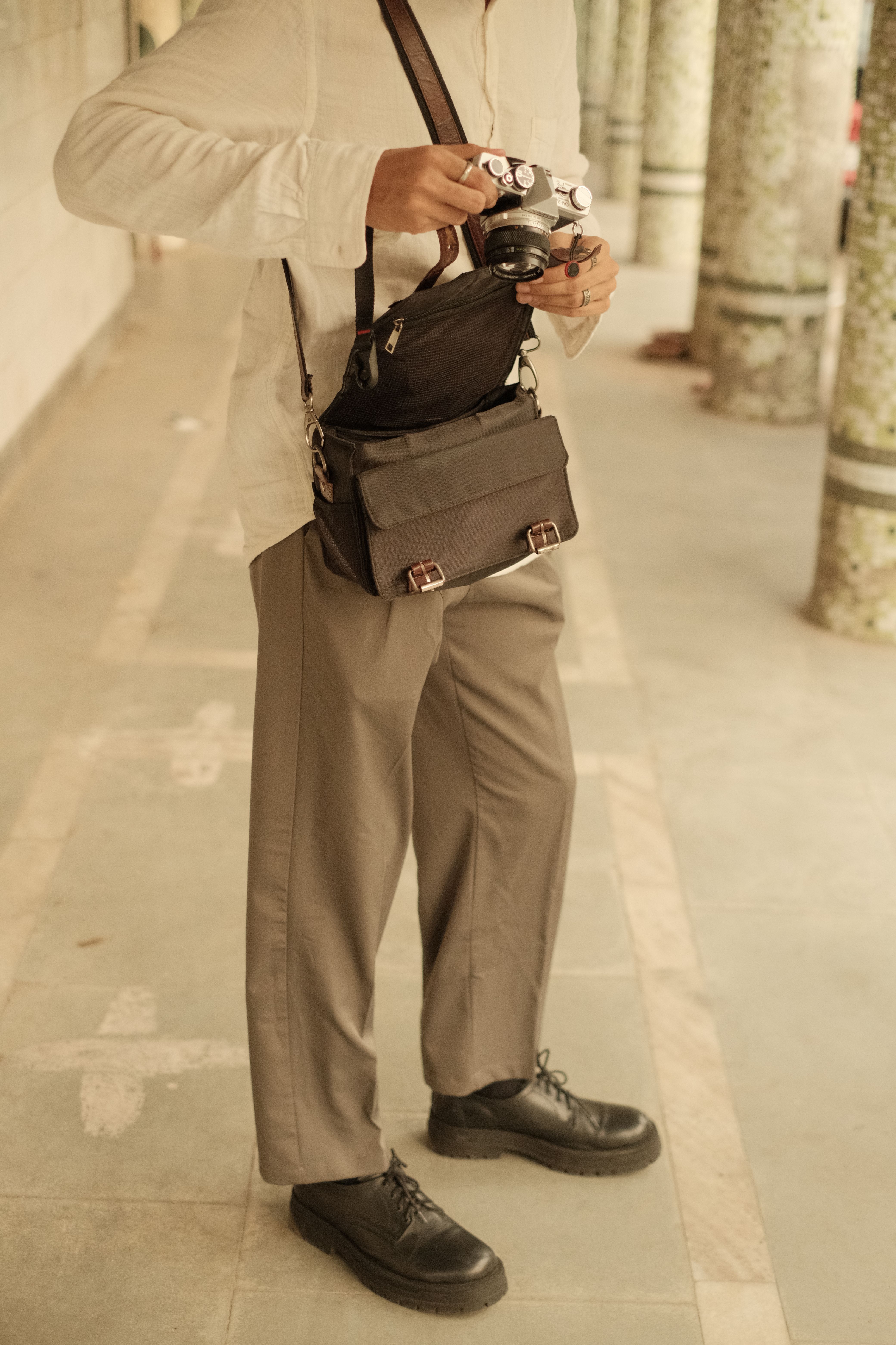 Man Standing with Bag and Camera · Free Stock Photo