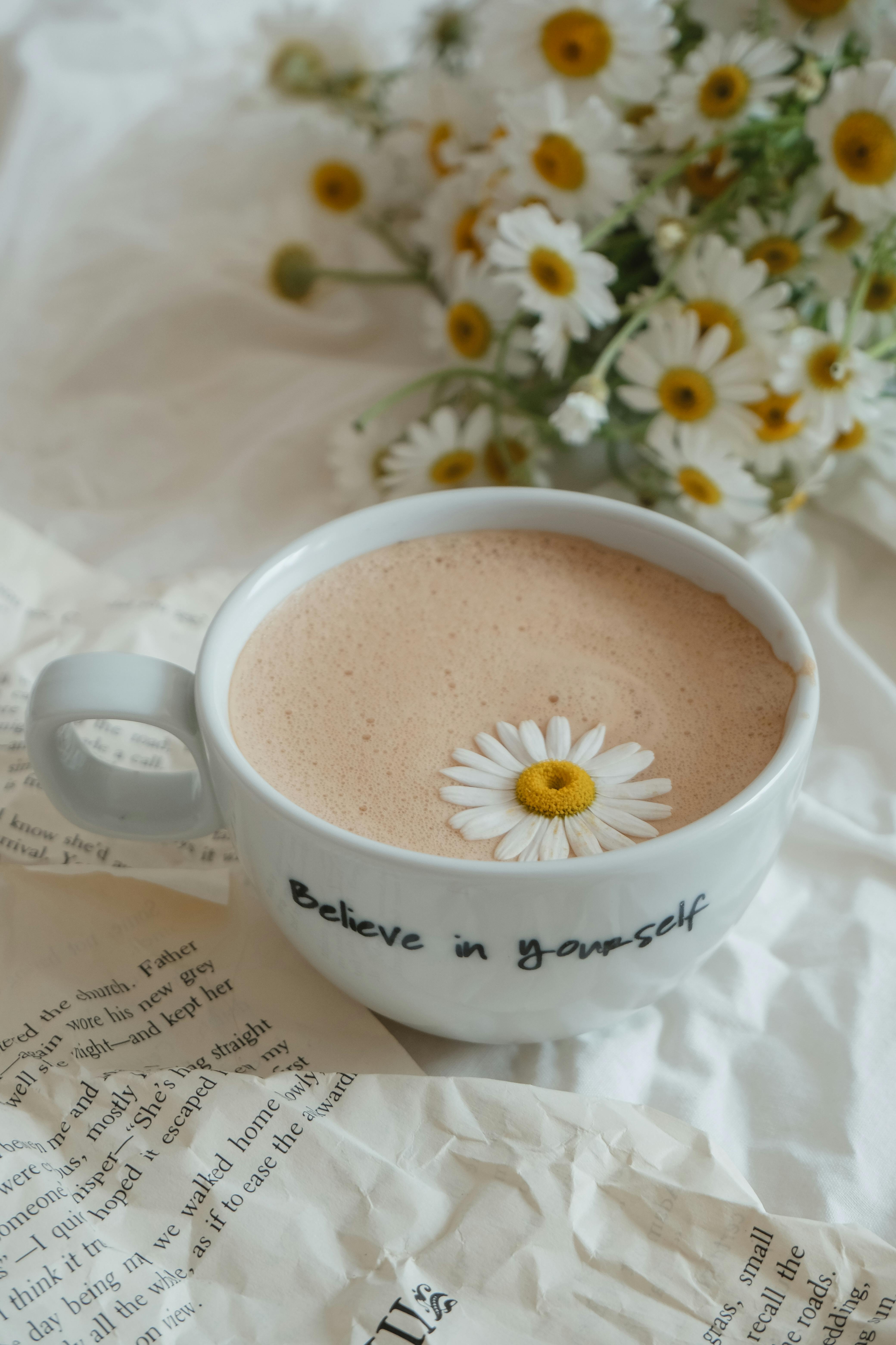 Coffee Cup with Daisy · Free Stock Photo