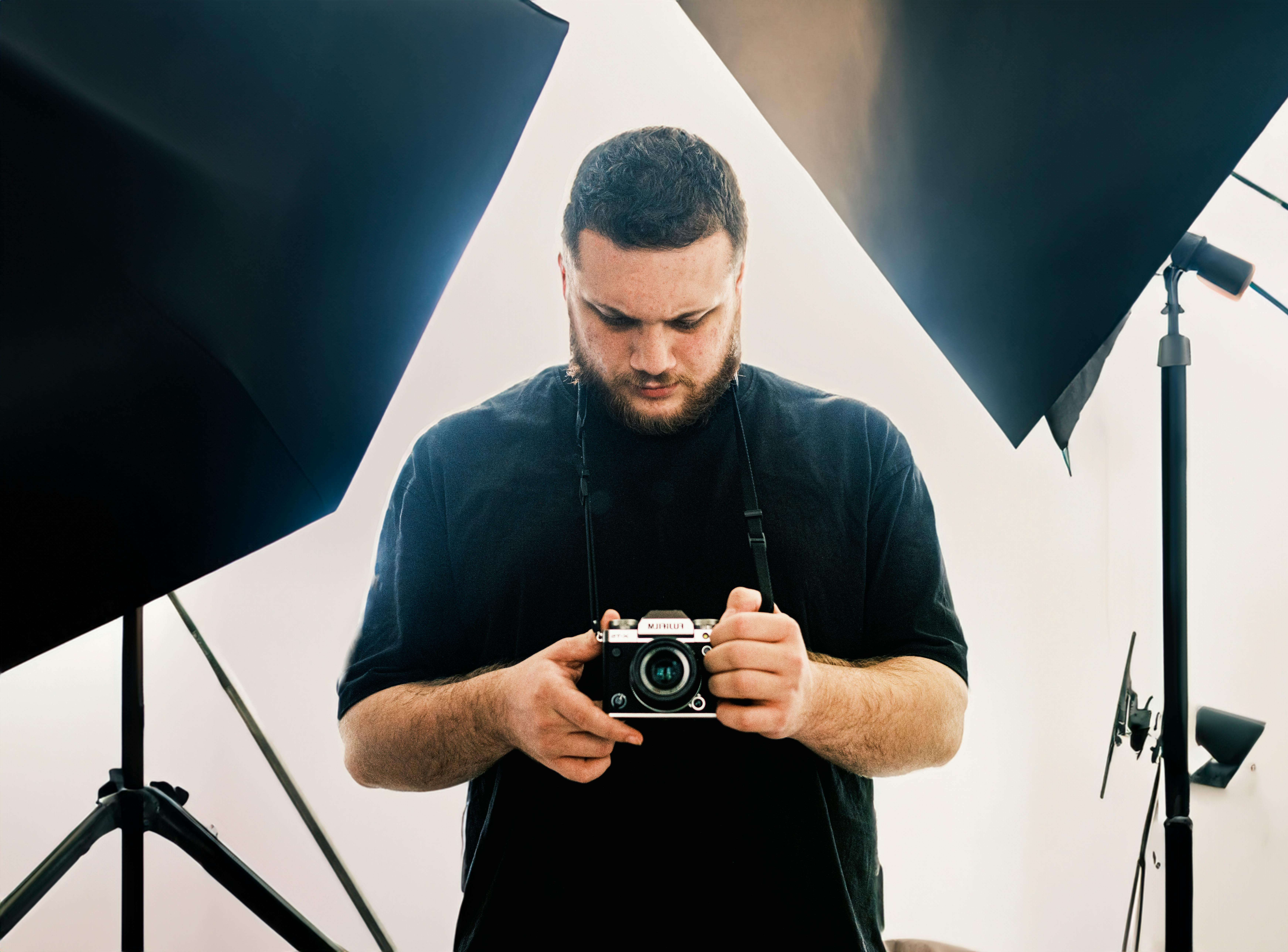 Bearded Photographer in Studio · Free Stock Photo