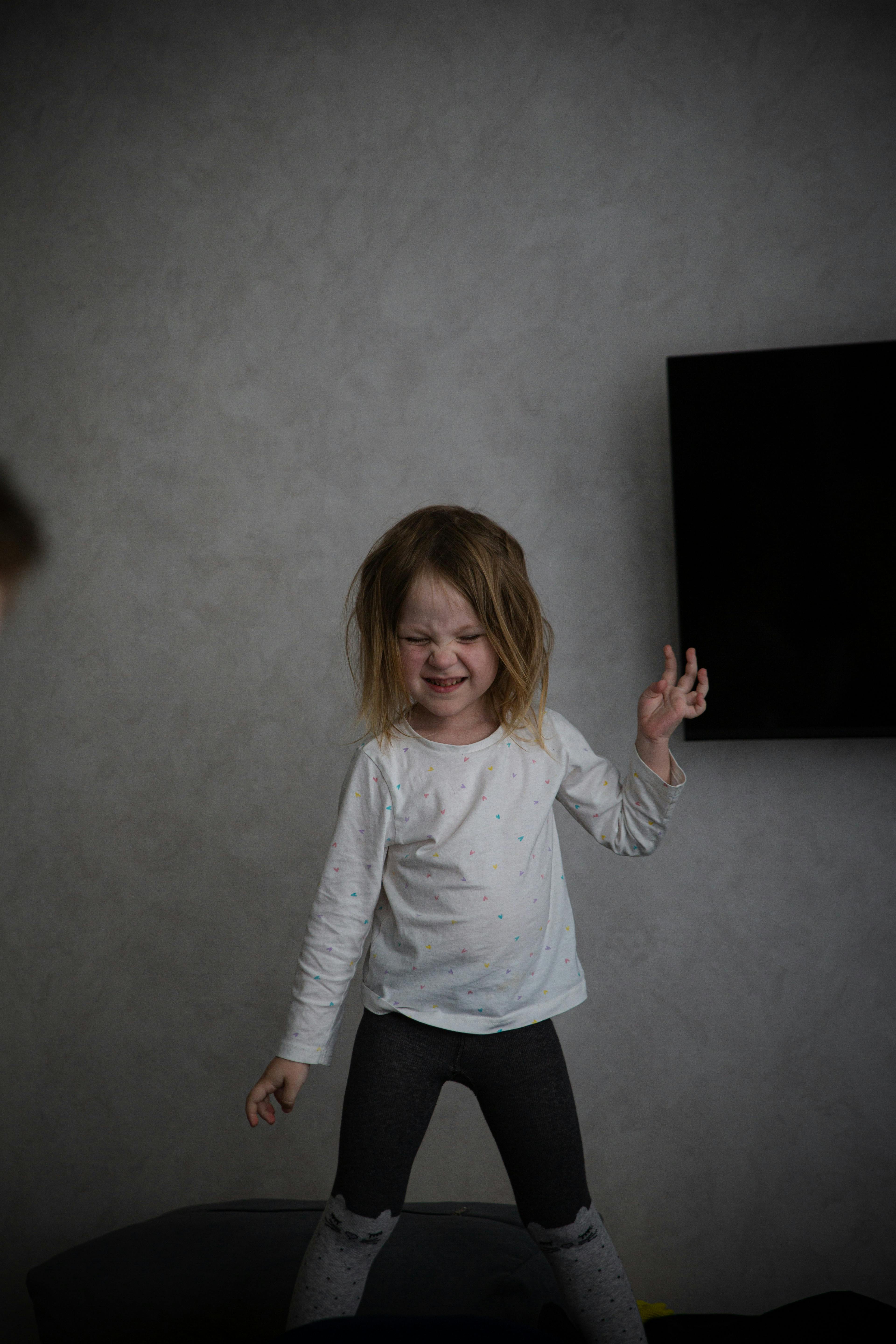 Little Girl Making Grimace on Face · Free Stock Photo