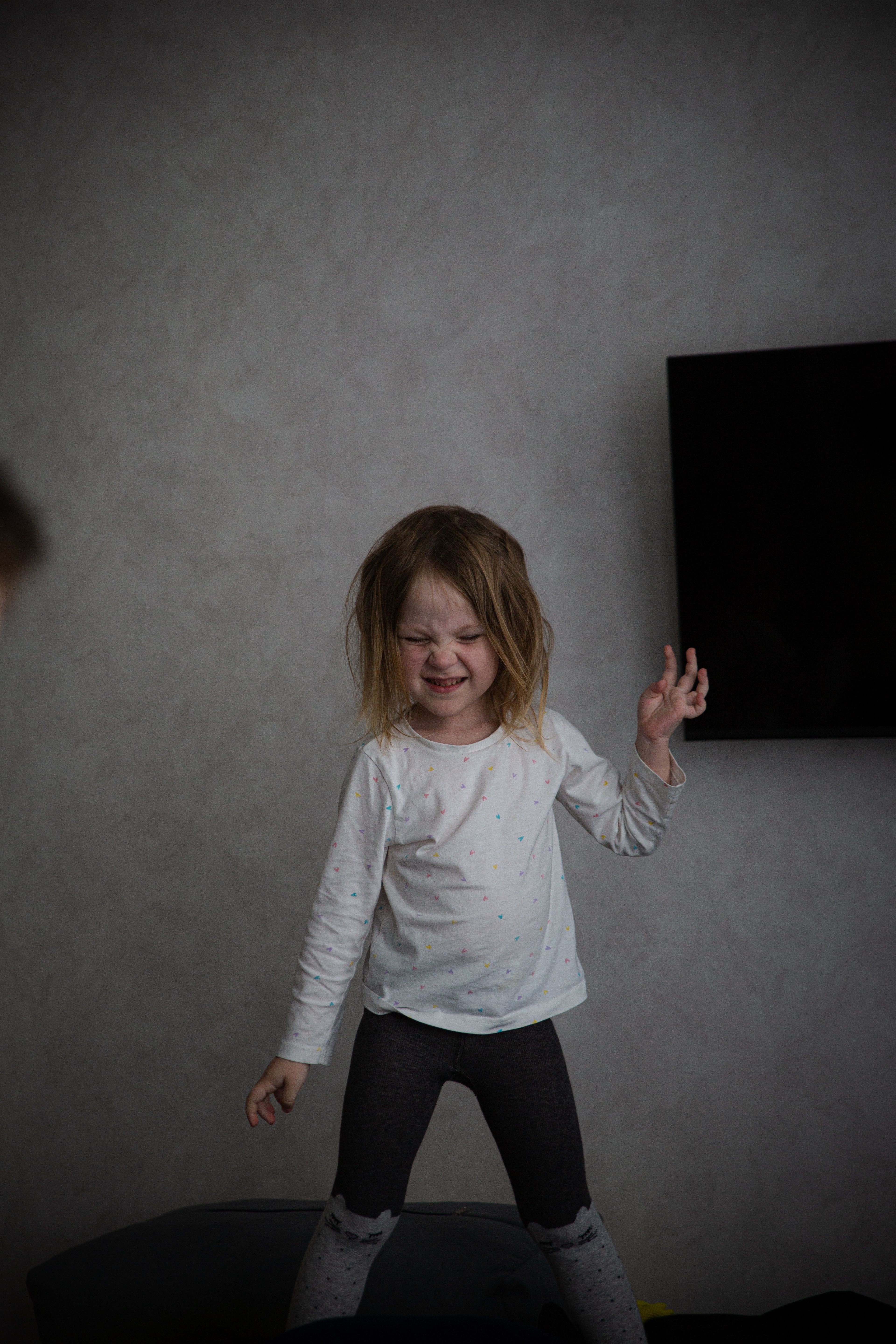 Little Girl Making Grimace on Face · Free Stock Photo