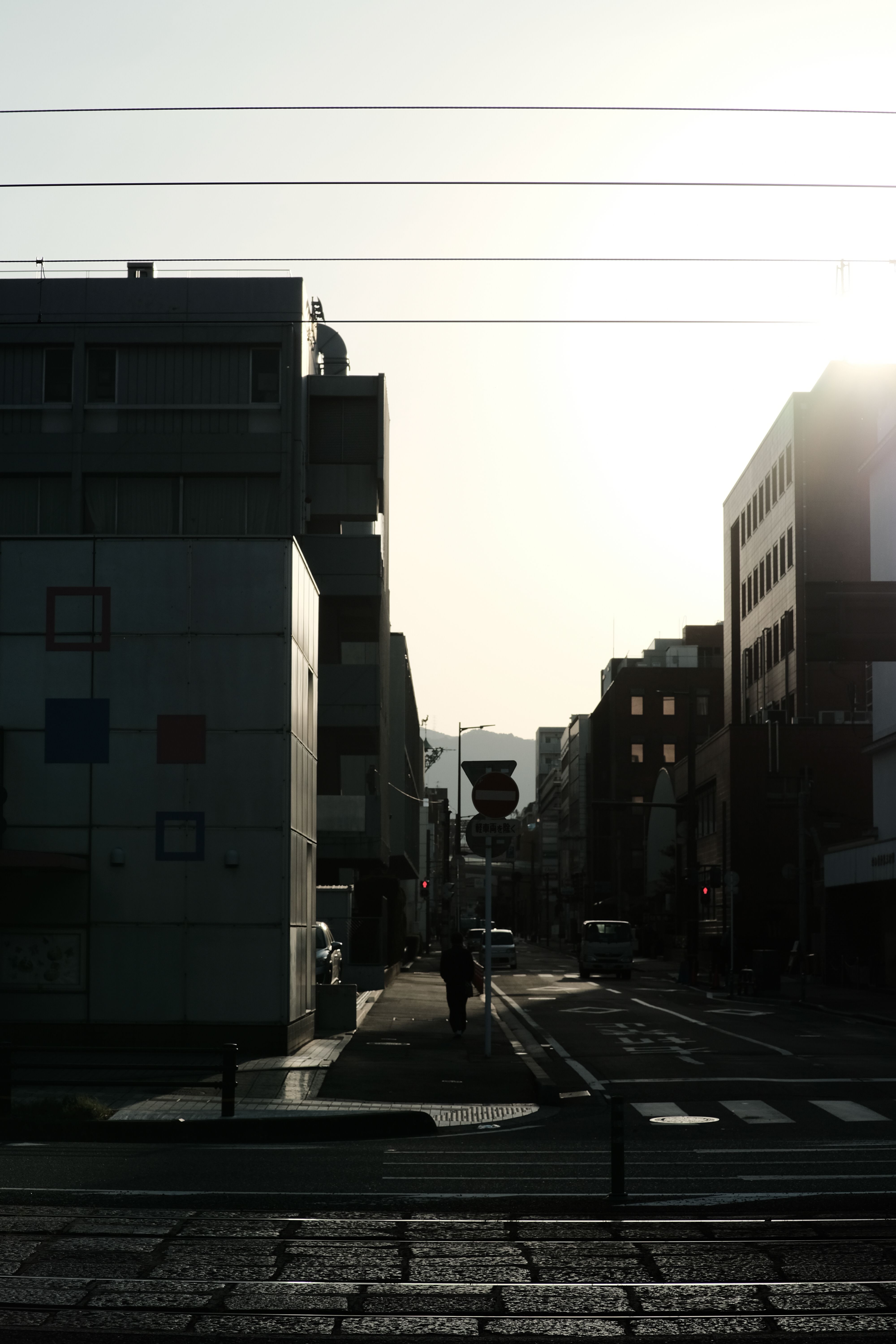 Sunlight over Buildings and Street at Sunset · Free Stock Photo