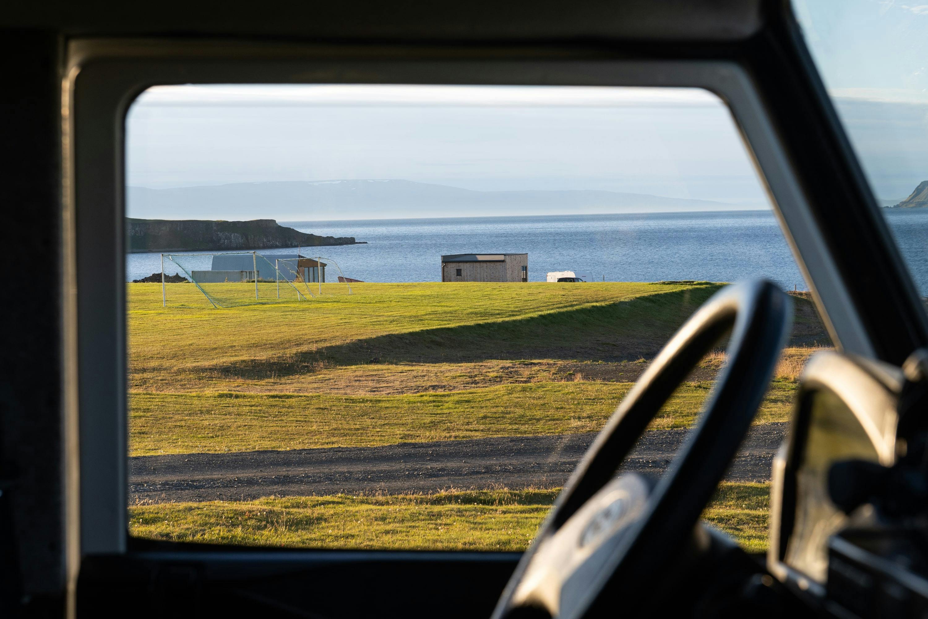 A view of the ocean from inside a vehicle · Free Stock Photo