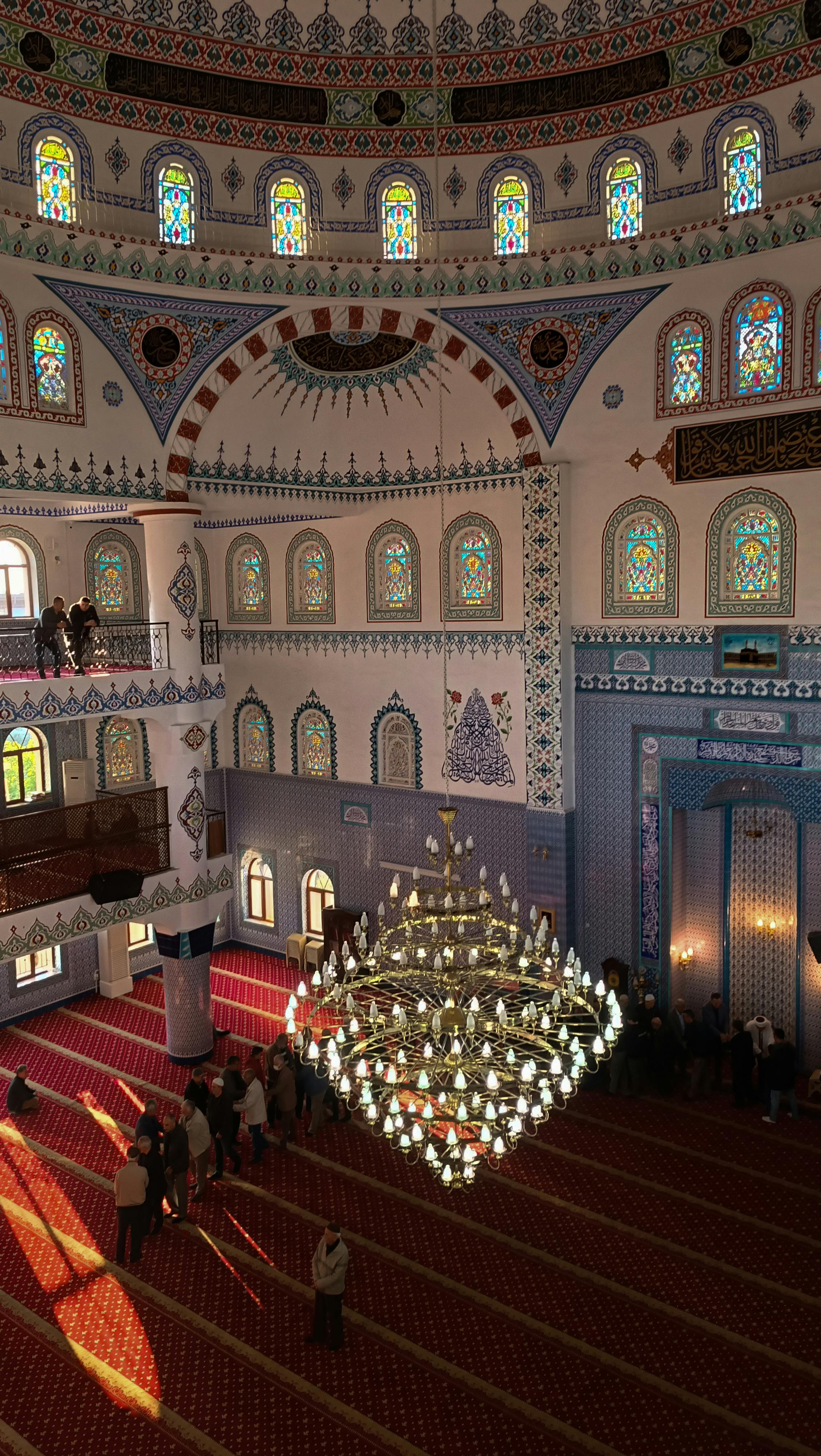 A Crystal Chandelier and a Mosaic Dome in a Mosque · Free Stock Photo