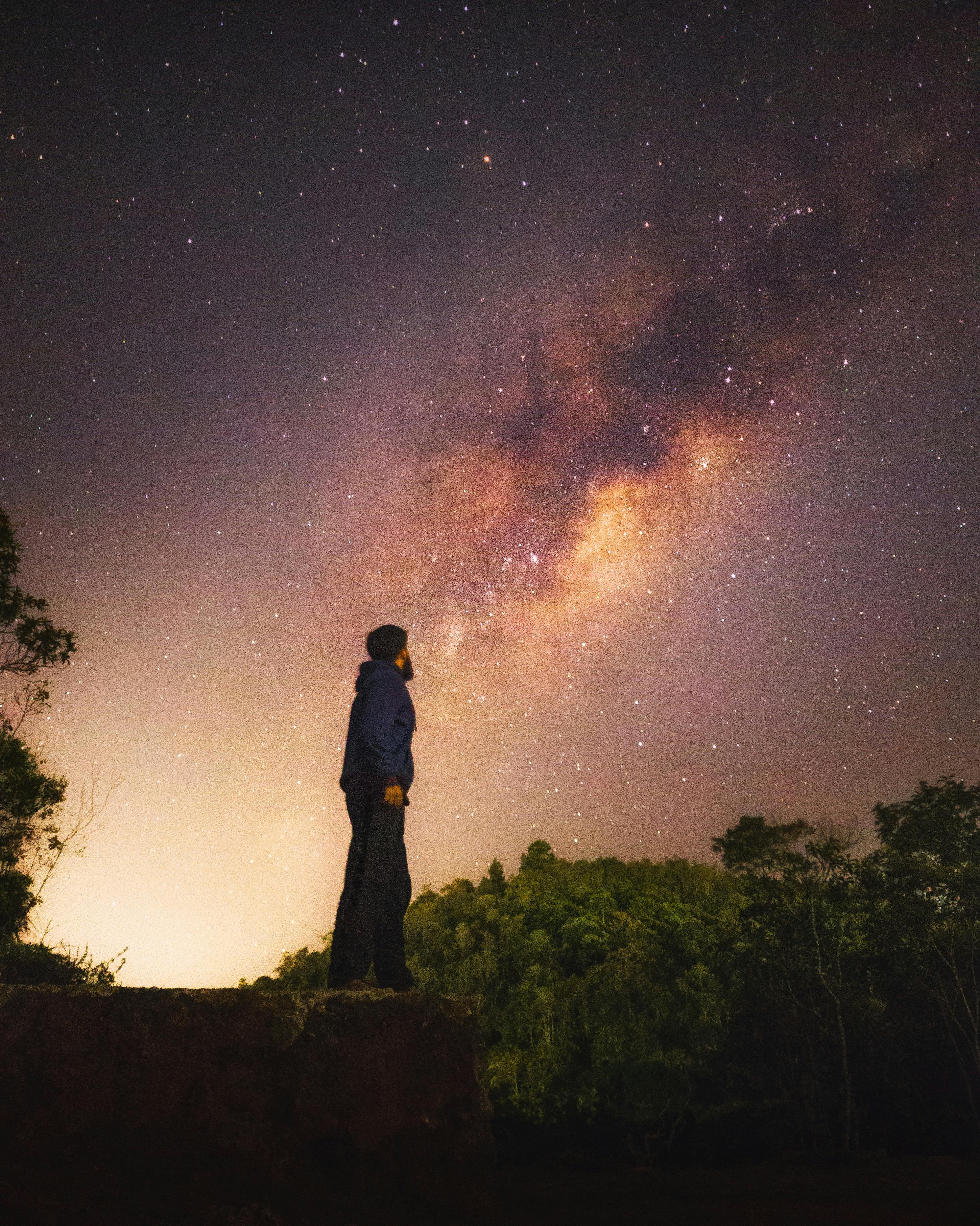 Man Observing Stars at Night · Free Stock Photo