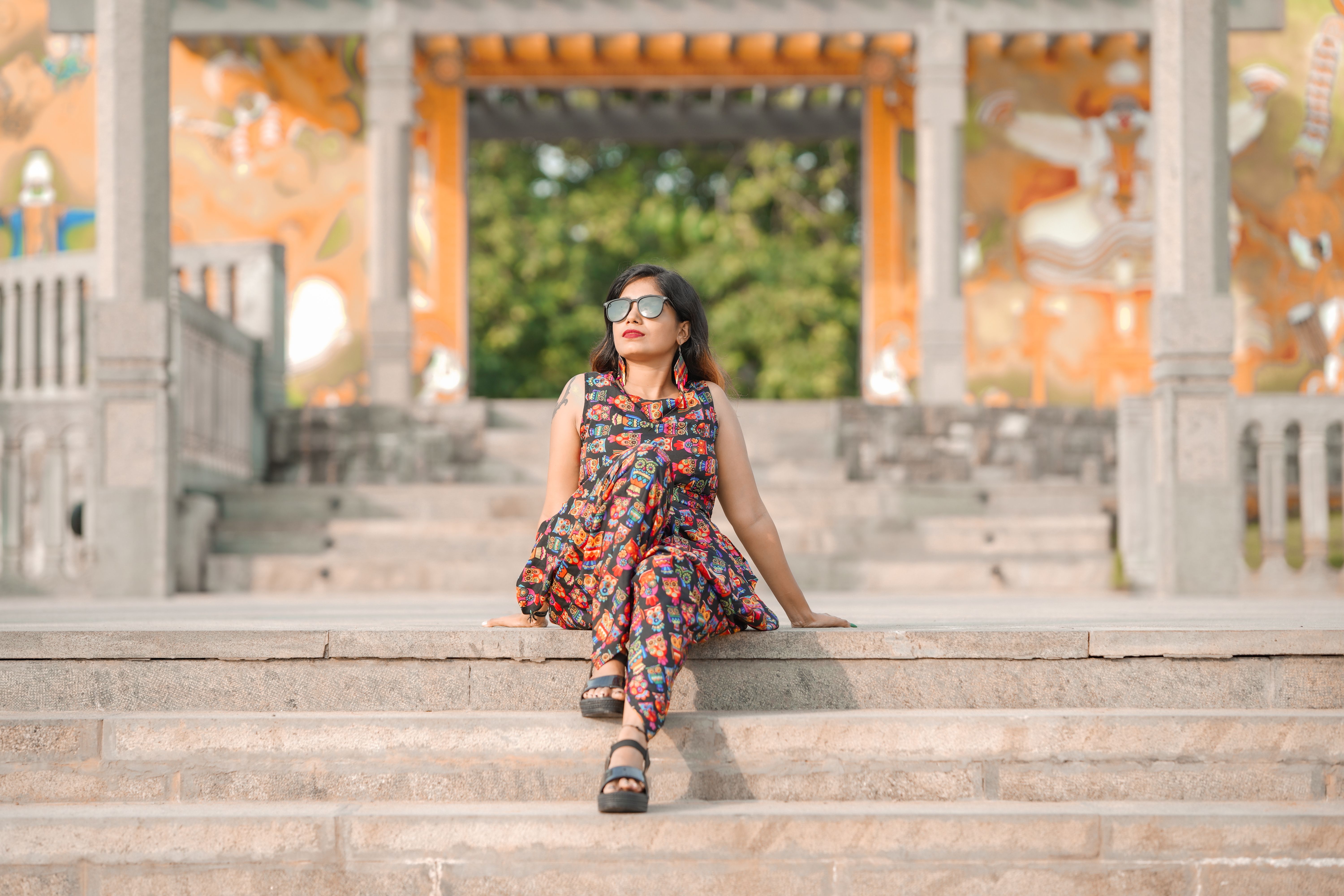 Woman in Dress Posing on Stairs · Free Stock Photo