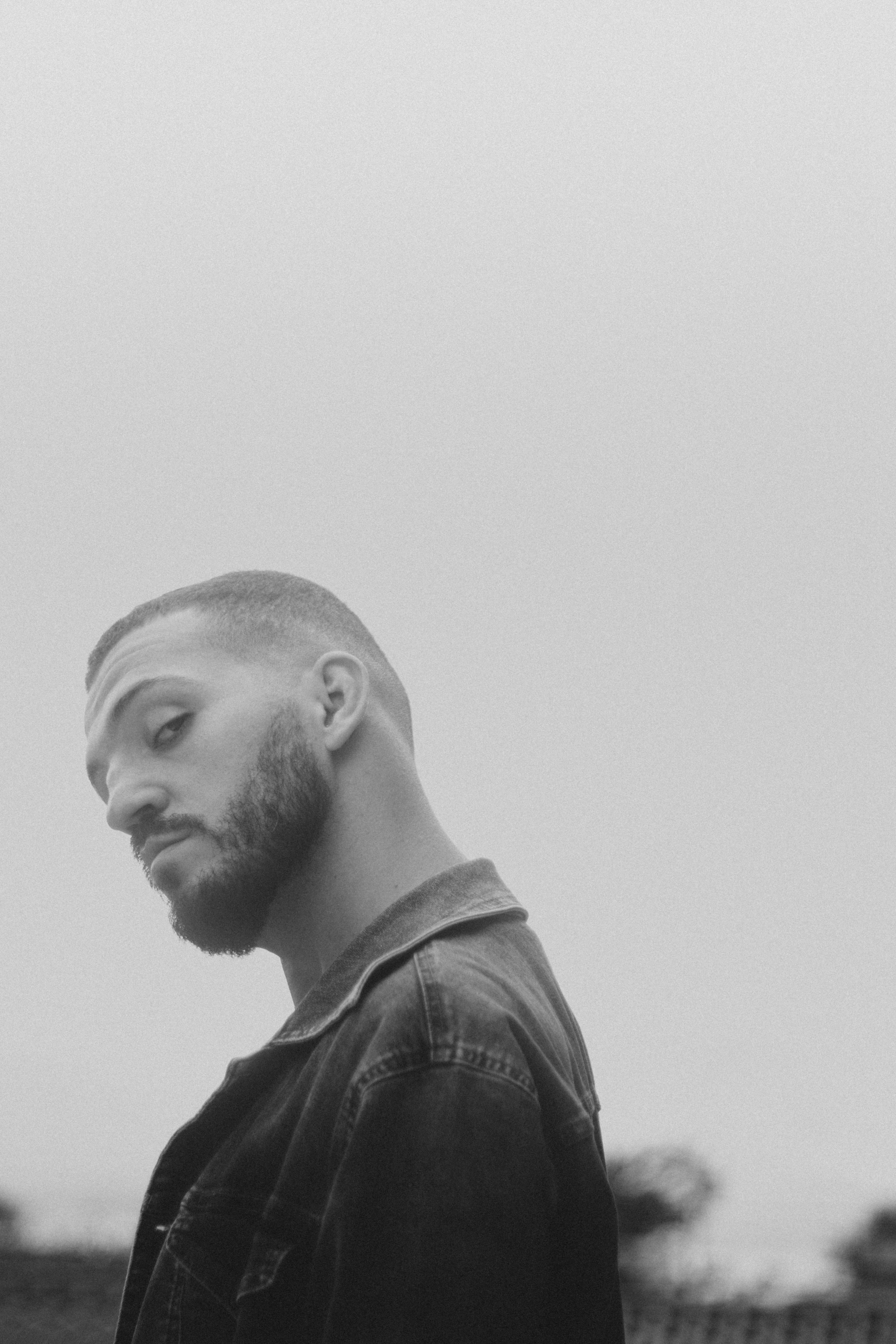 Man Posing in Black and White · Free Stock Photo