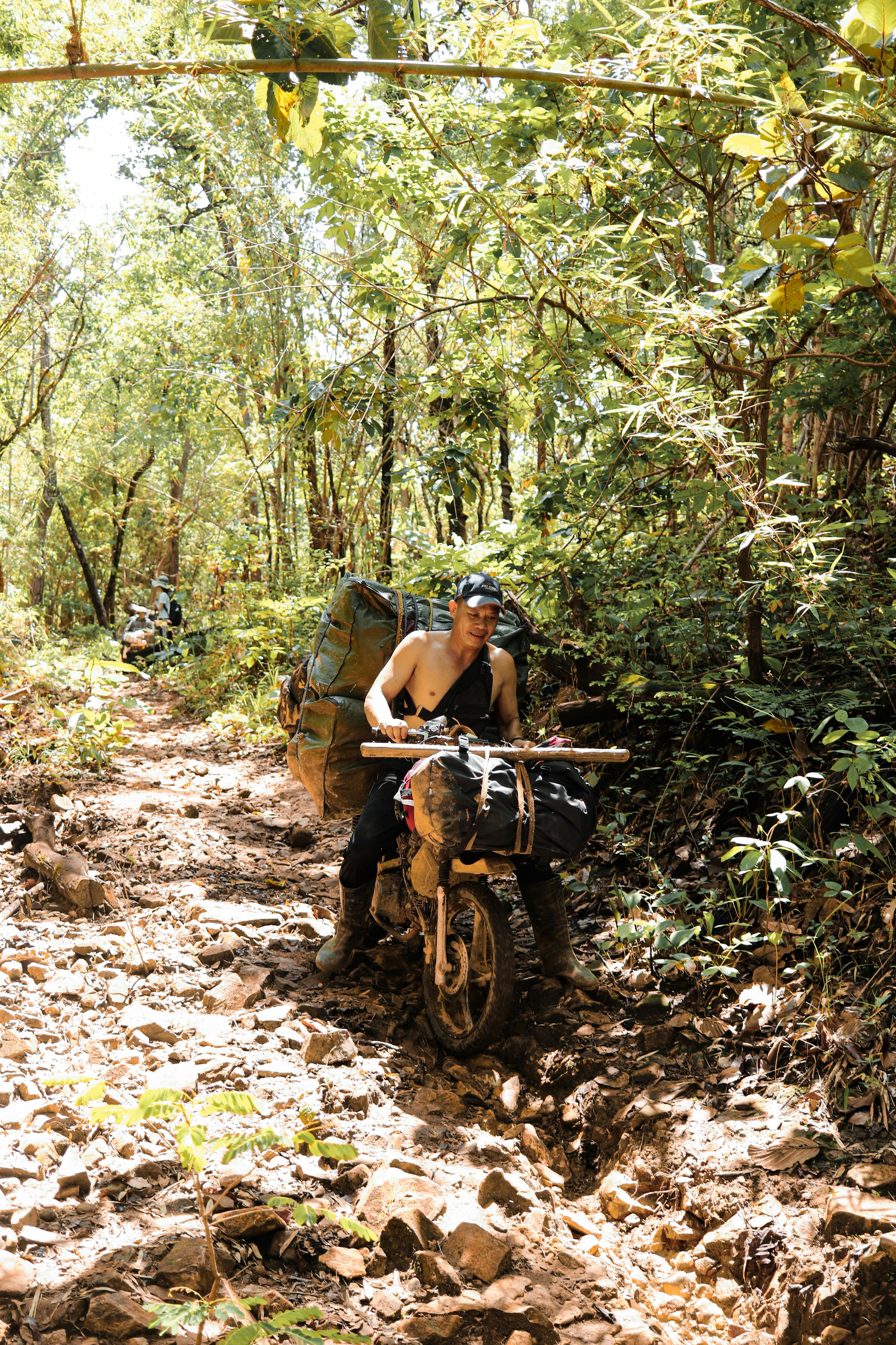Photo of Man Riding Motorcycle in the Forest · Free Stock Photo
