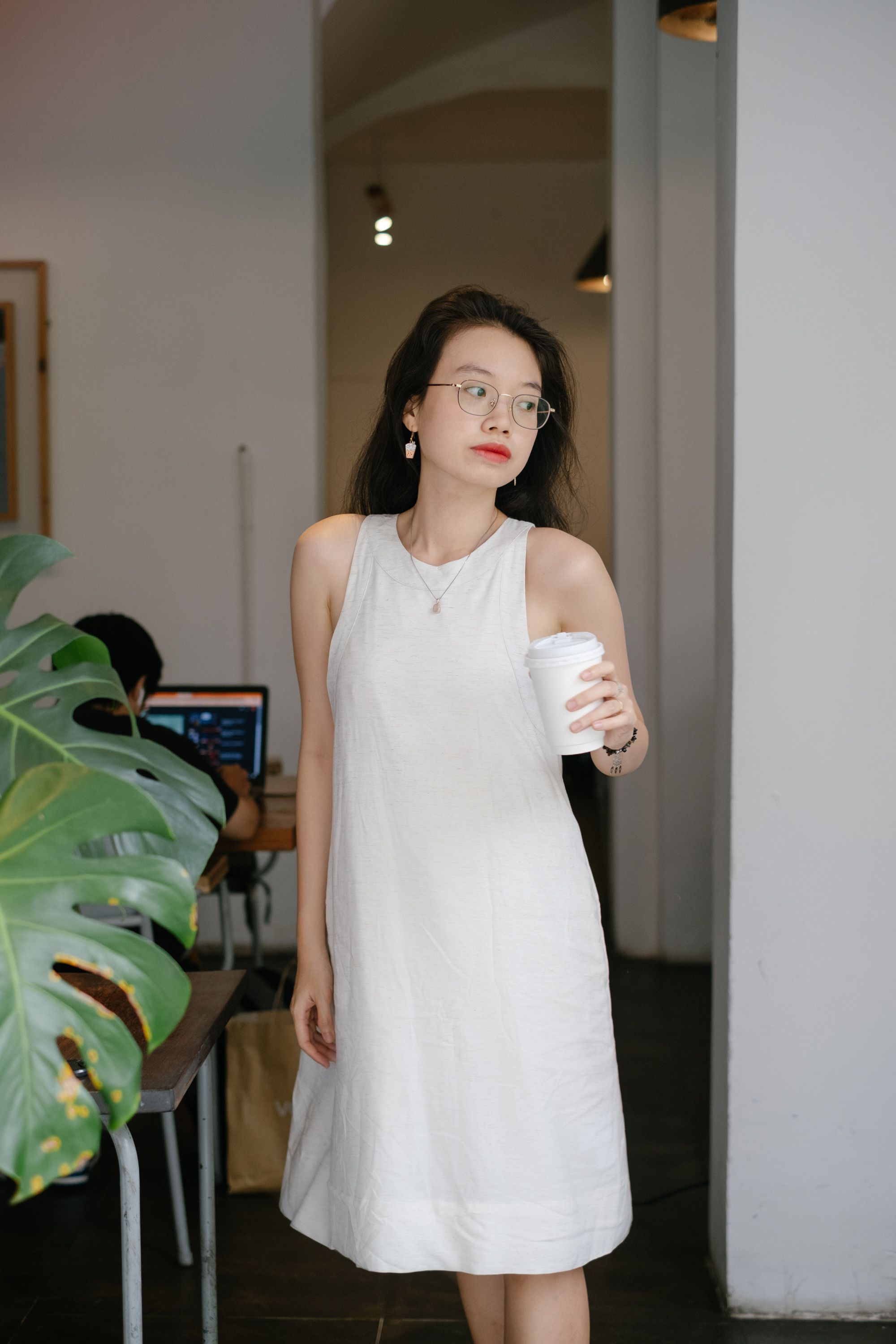 Woman in Patterned Dress · Free Stock Photo