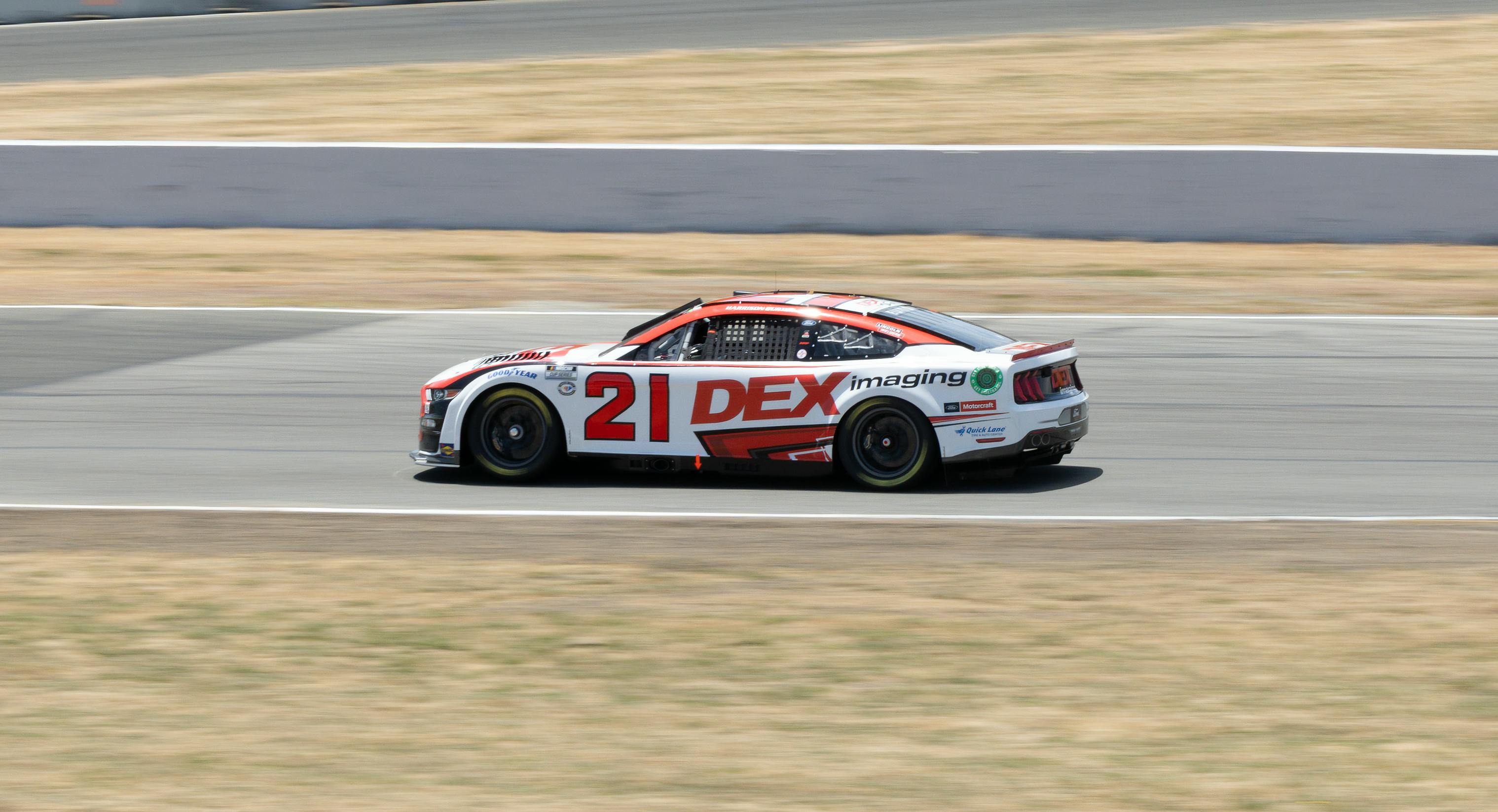 A Race Car on the Track during a NASCAR Race · Free Stock Photo