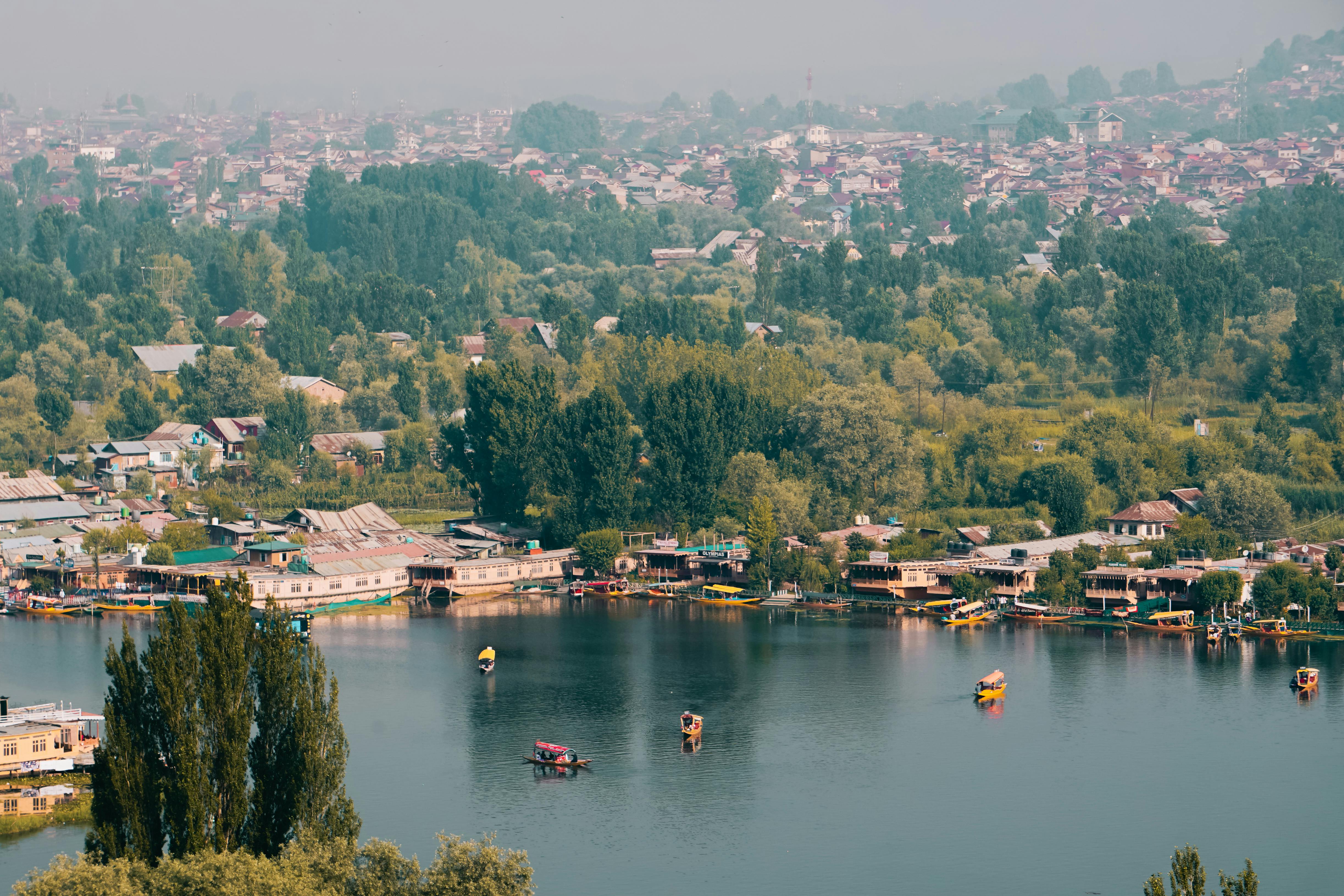 Aerial View of a Waterfront Houses at the Dal Lake Shore · Free Stock Photo
