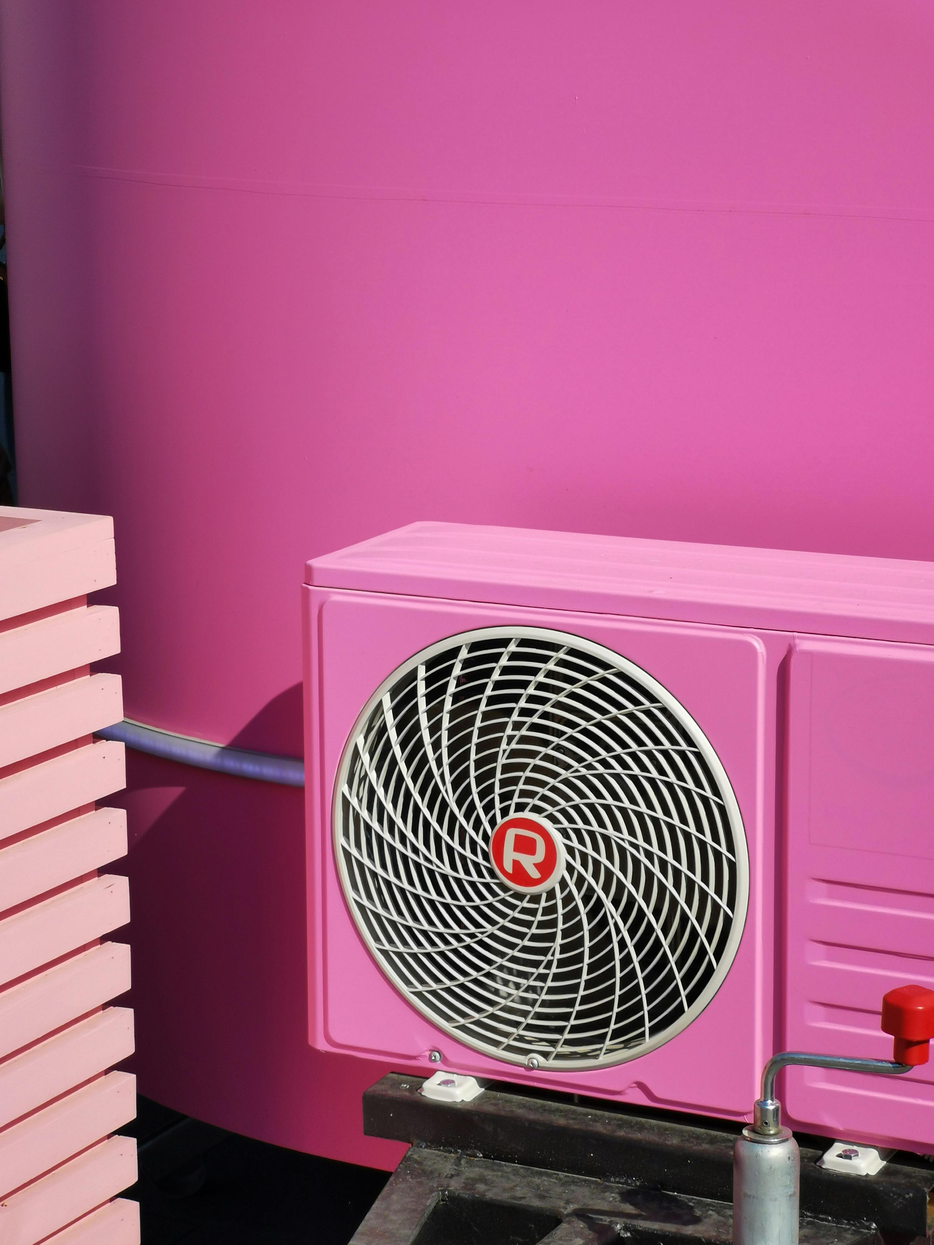 A Pink Wall and Pink Air Conditioner · Free Stock Photo