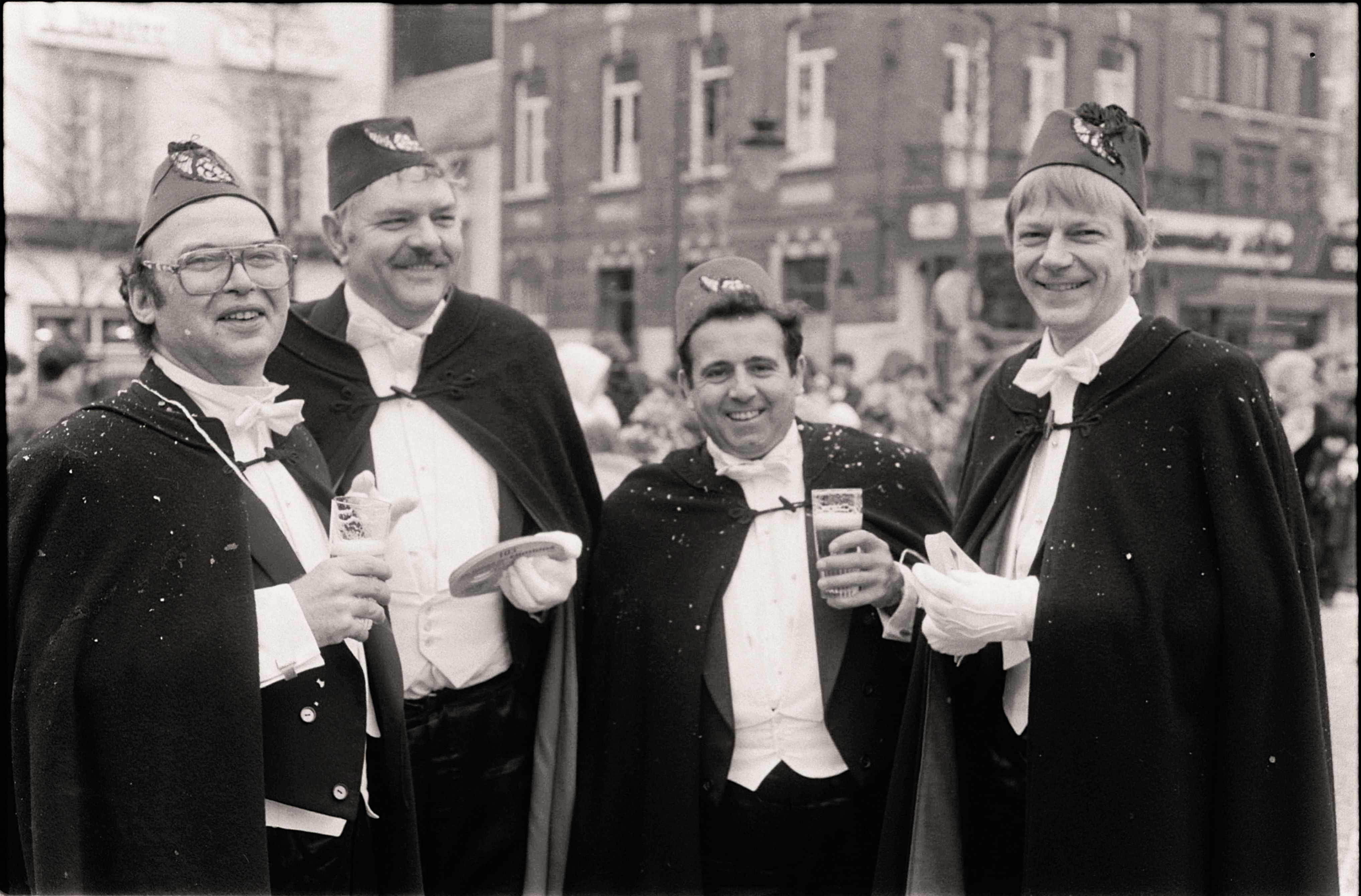 An Old Photograph of Two Men Holding Glasses of Beer · Free Stock Photo