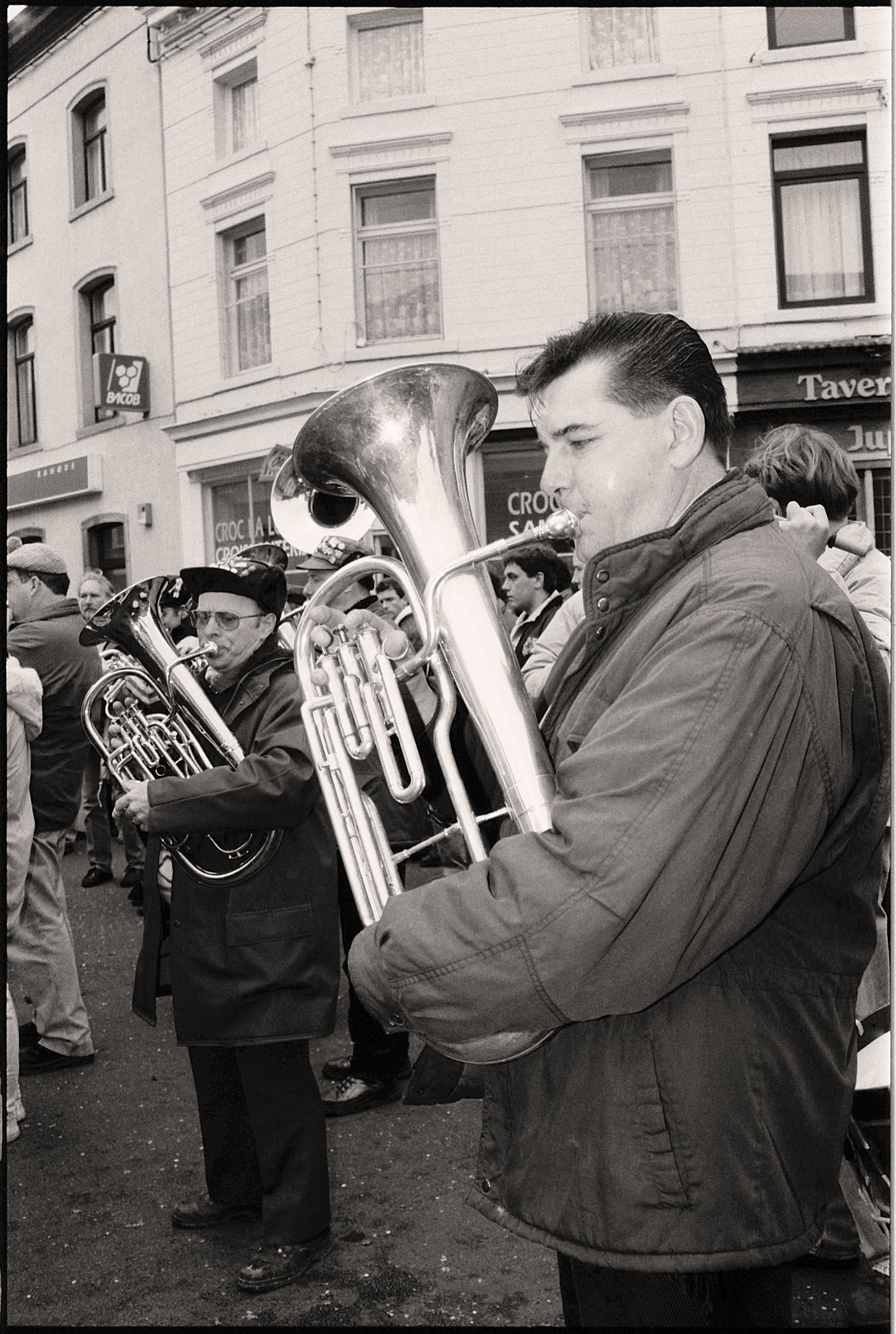 Men Playing Music on Parade · Free Stock Photo