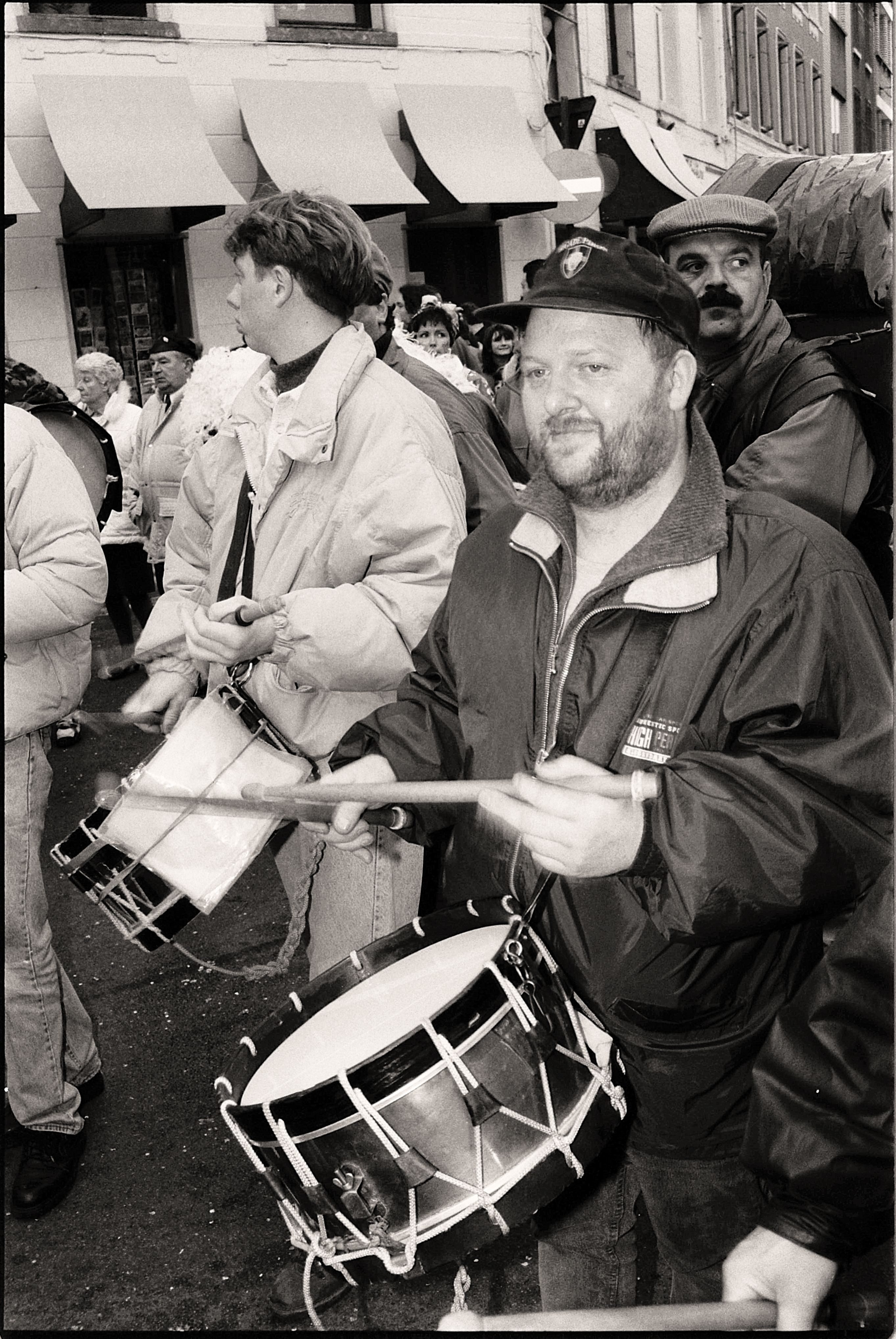 Men Playing Music on Parade · Free Stock Photo