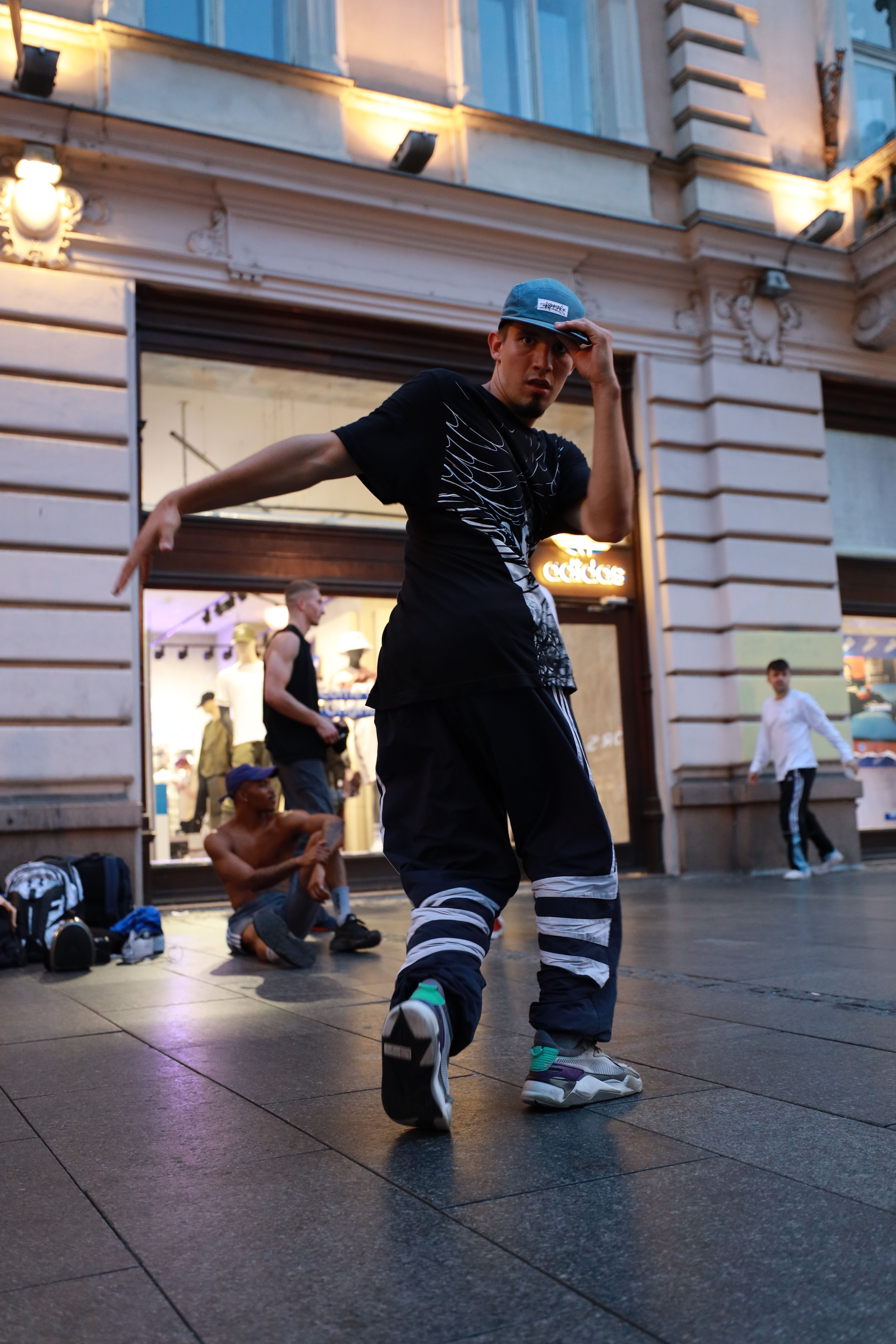 Man Breakdancing on Pavement in Town · Free Stock Photo