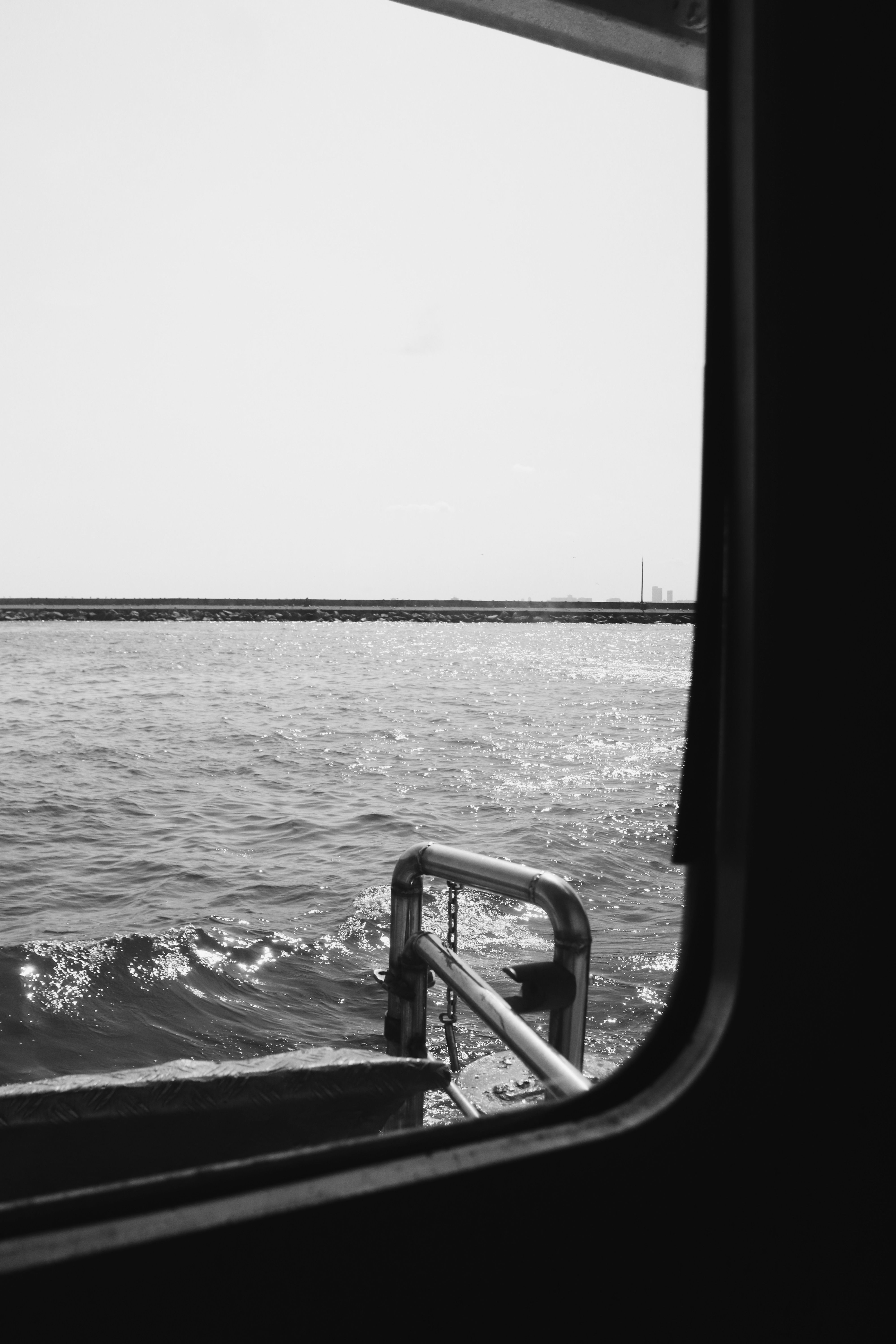 Sea behind Windows of Sailing Vessel · Free Stock Photo