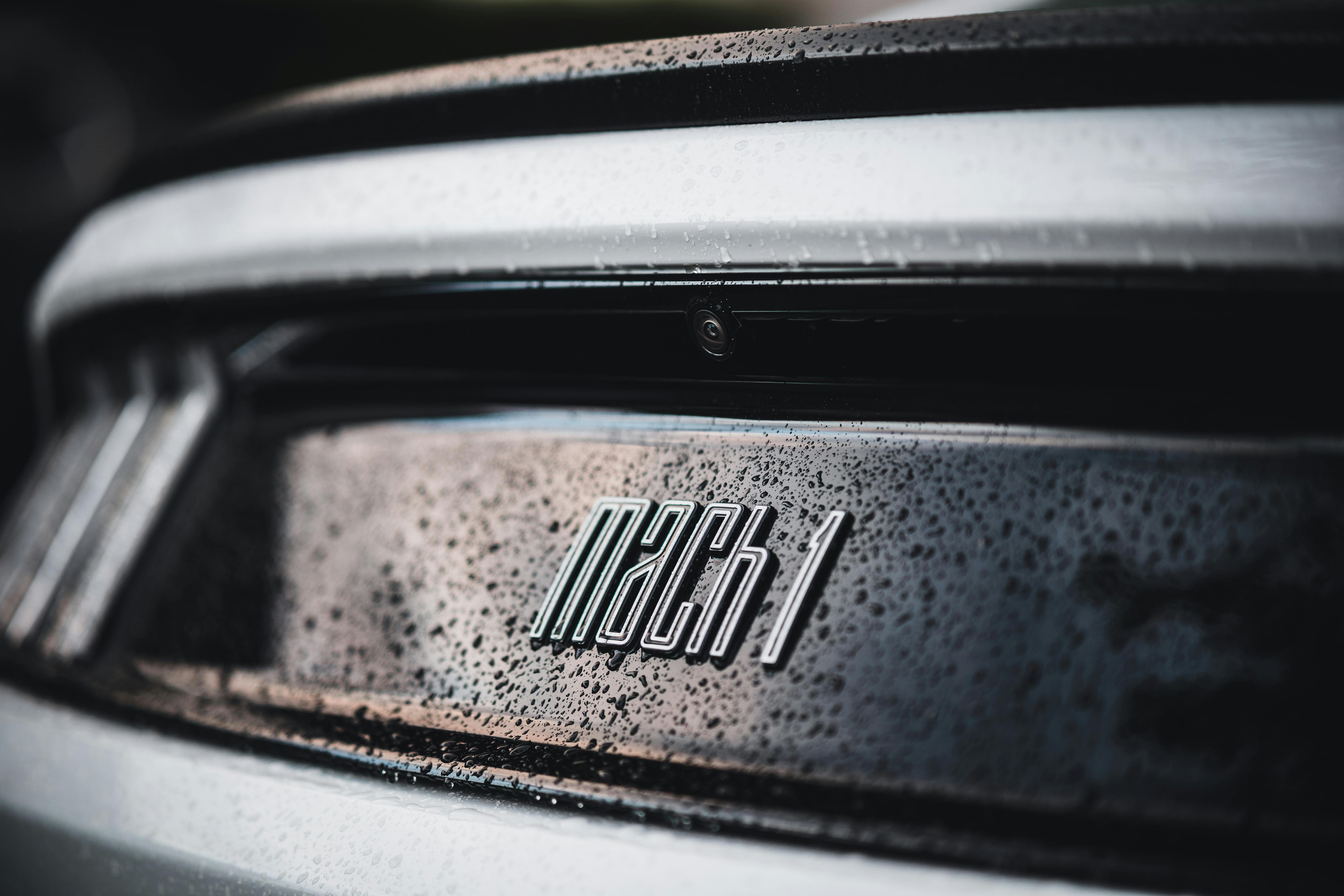 Close-up on Ford Mustangs Mach 1 Logo · Free Stock Photo
