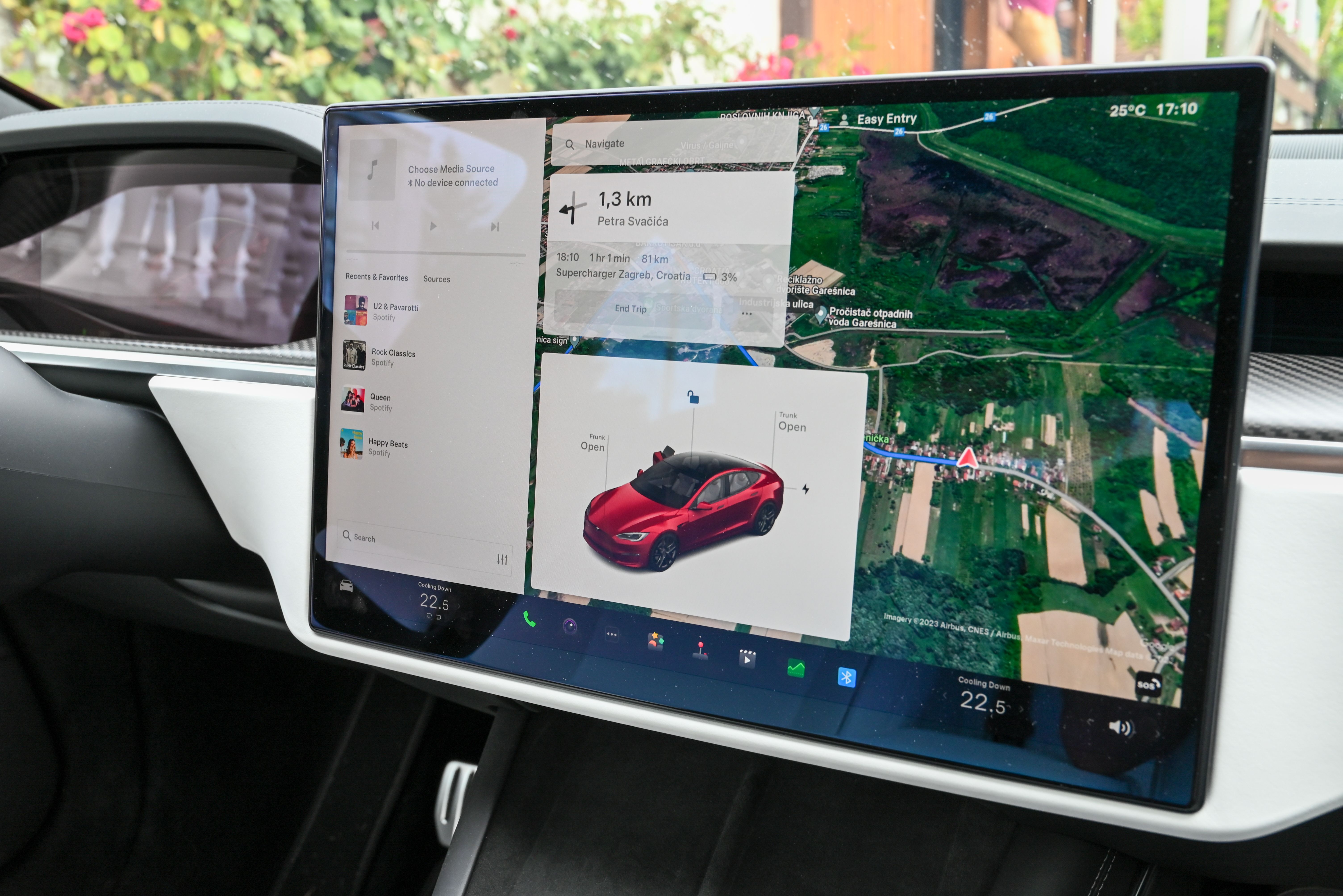 Tesla model 3 with a large screen in the center · Free Stock Photo