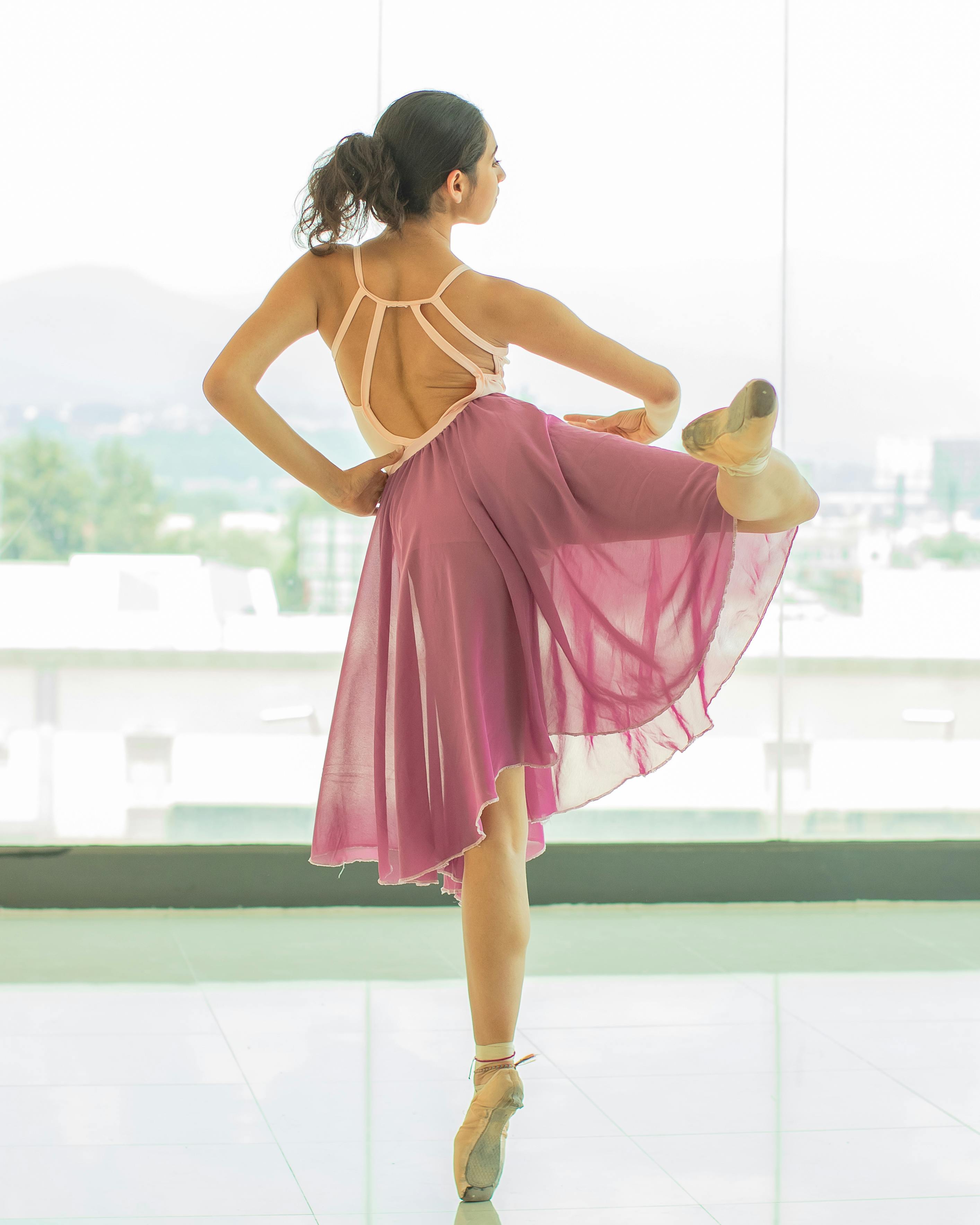 Ballet Dancer Standing on One Leg · Free Stock Photo