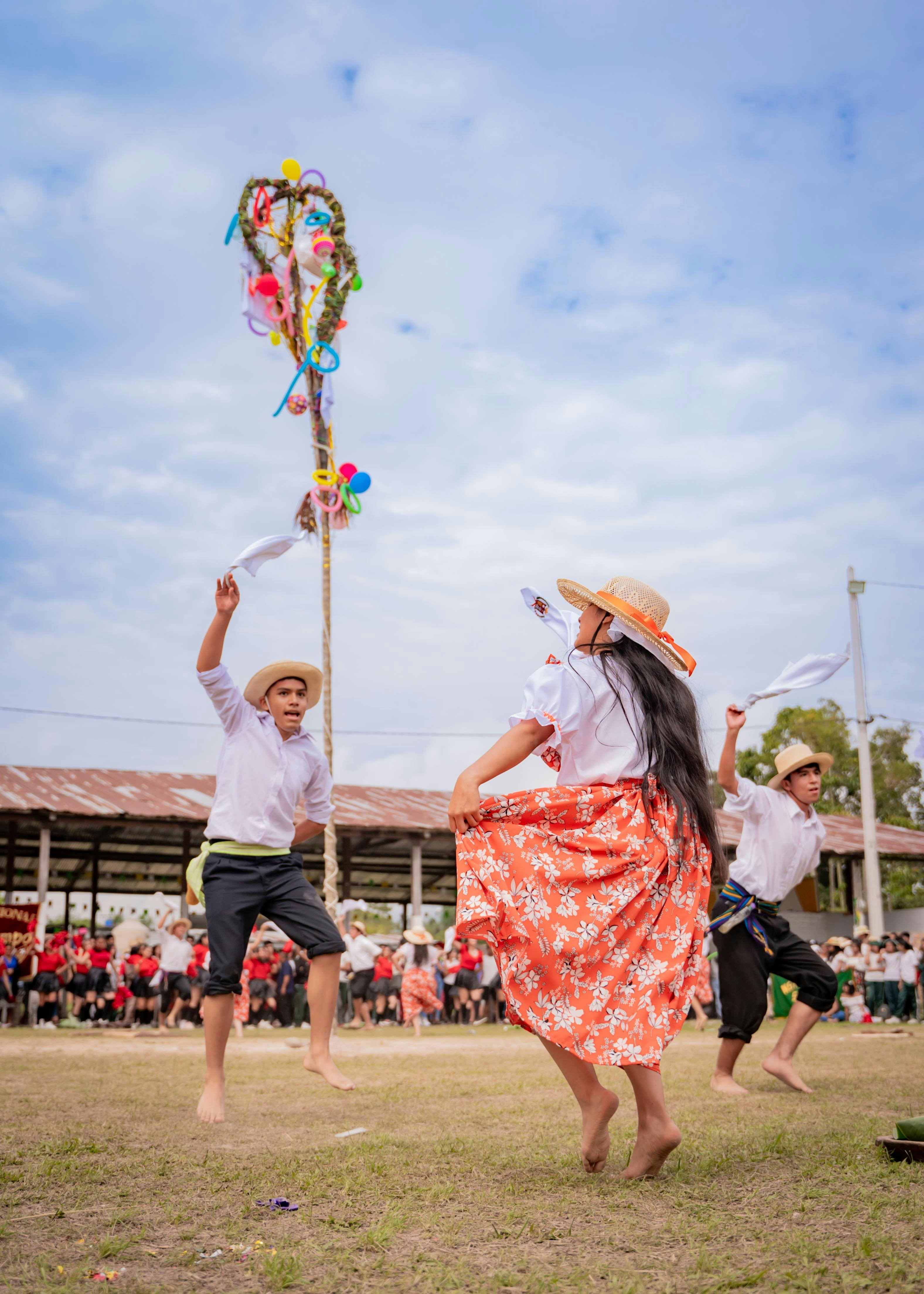 Woman and Men Dancing at Festival in Village · Free Stock Photo