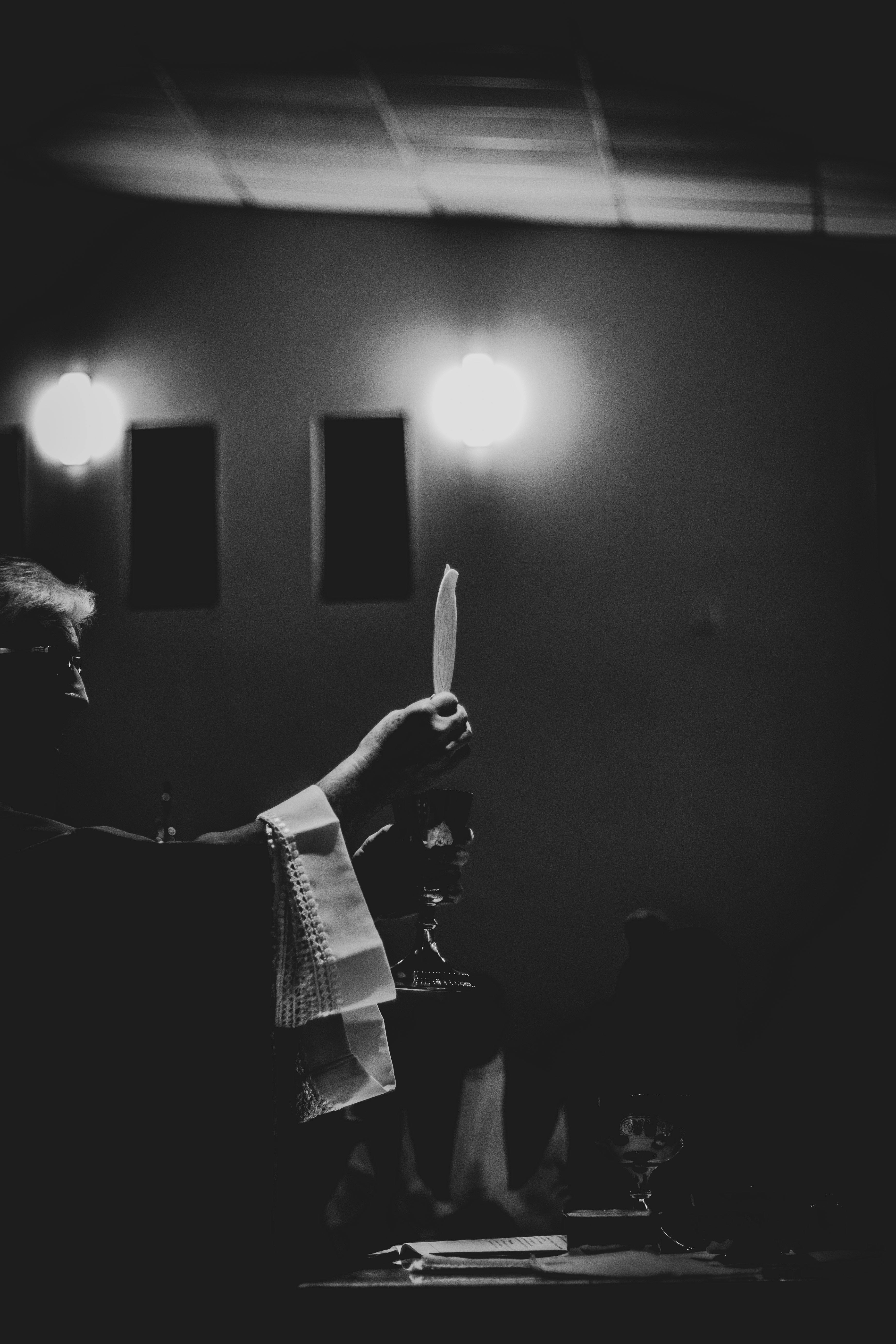 Priest in Ceremony in Black and White · Free Stock Photo