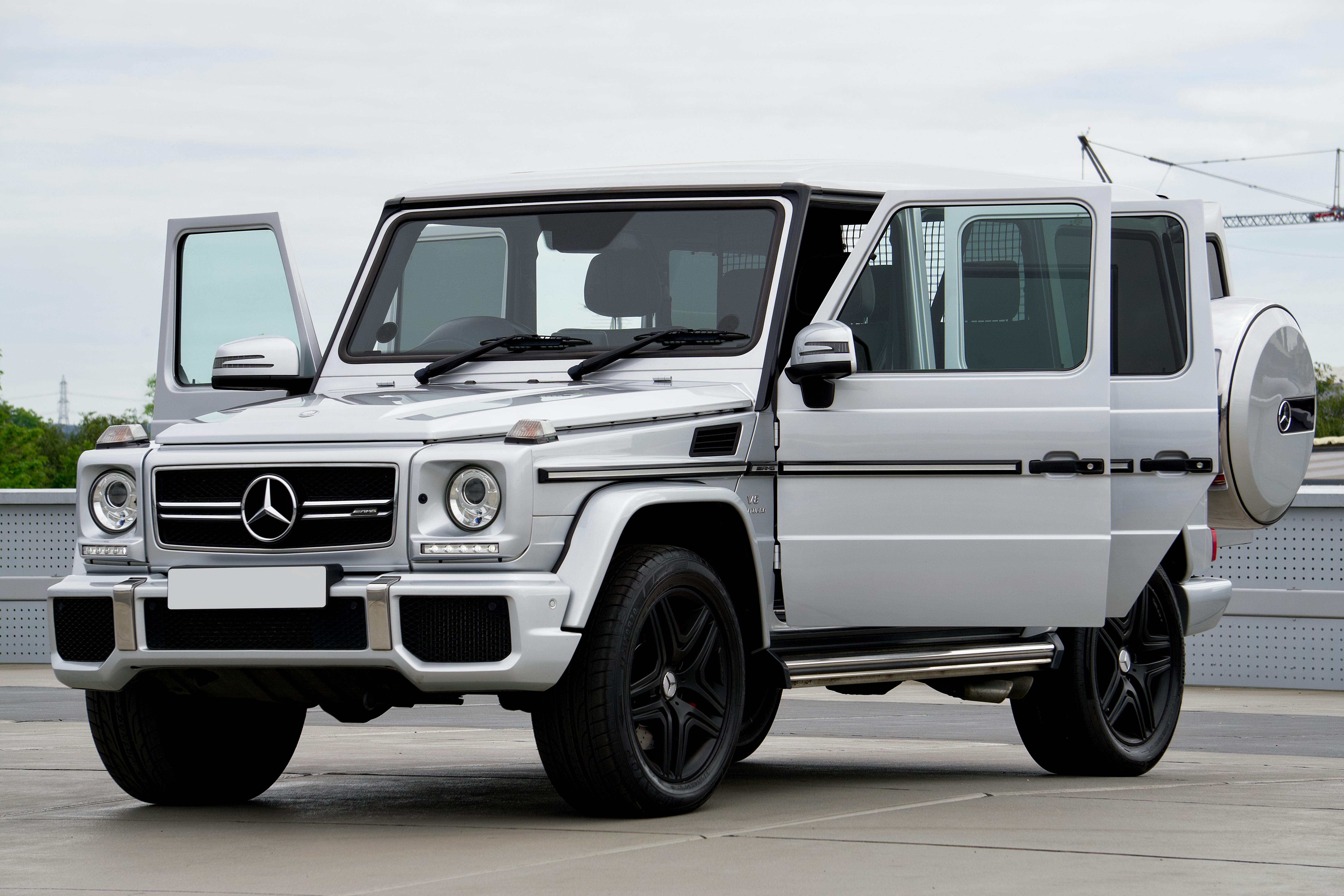 Silver Mercedes-Benz G-Class with Open Doors · Free Stock Photo